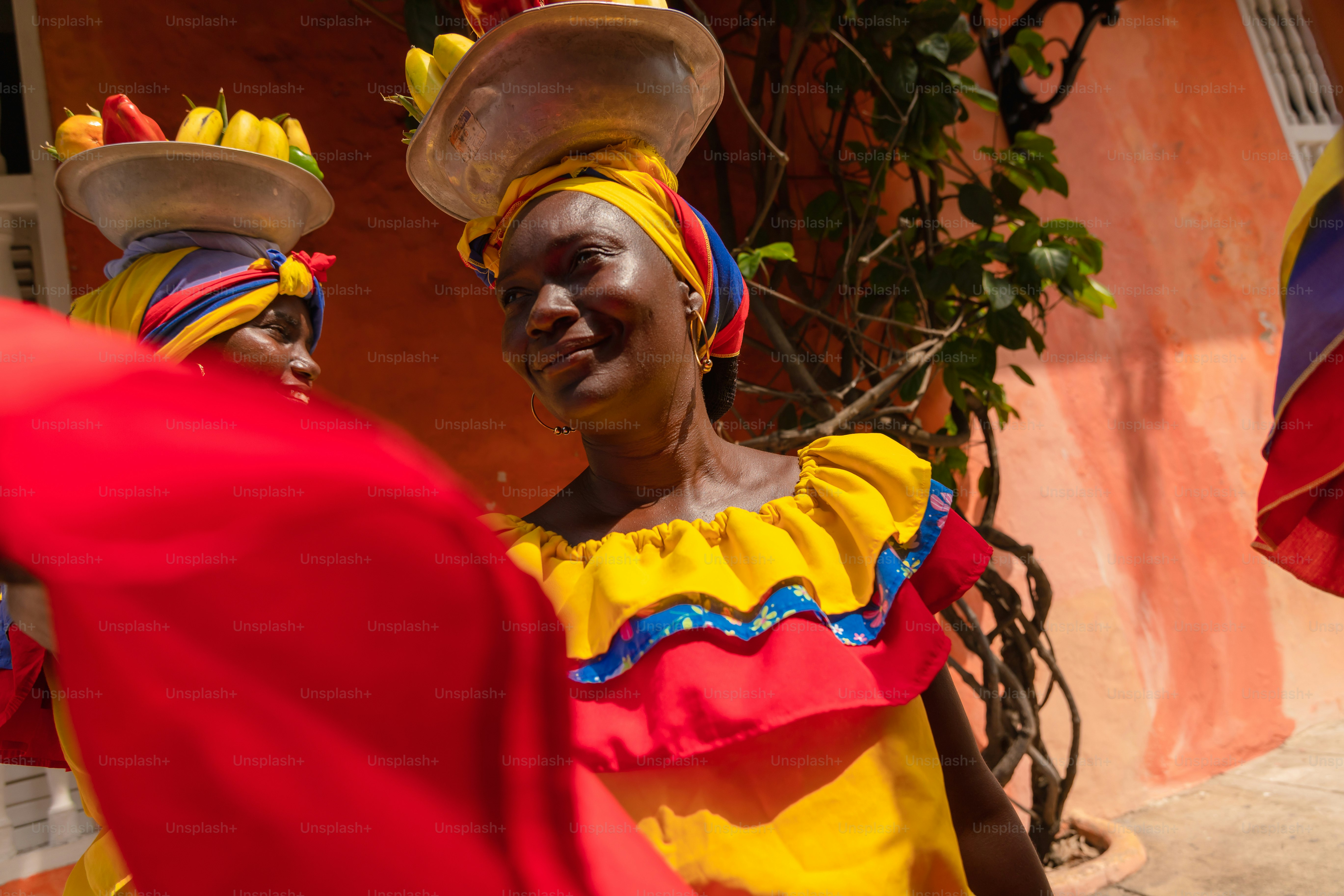 A group of women dressed in brightly colored clothing photo – Travel ...