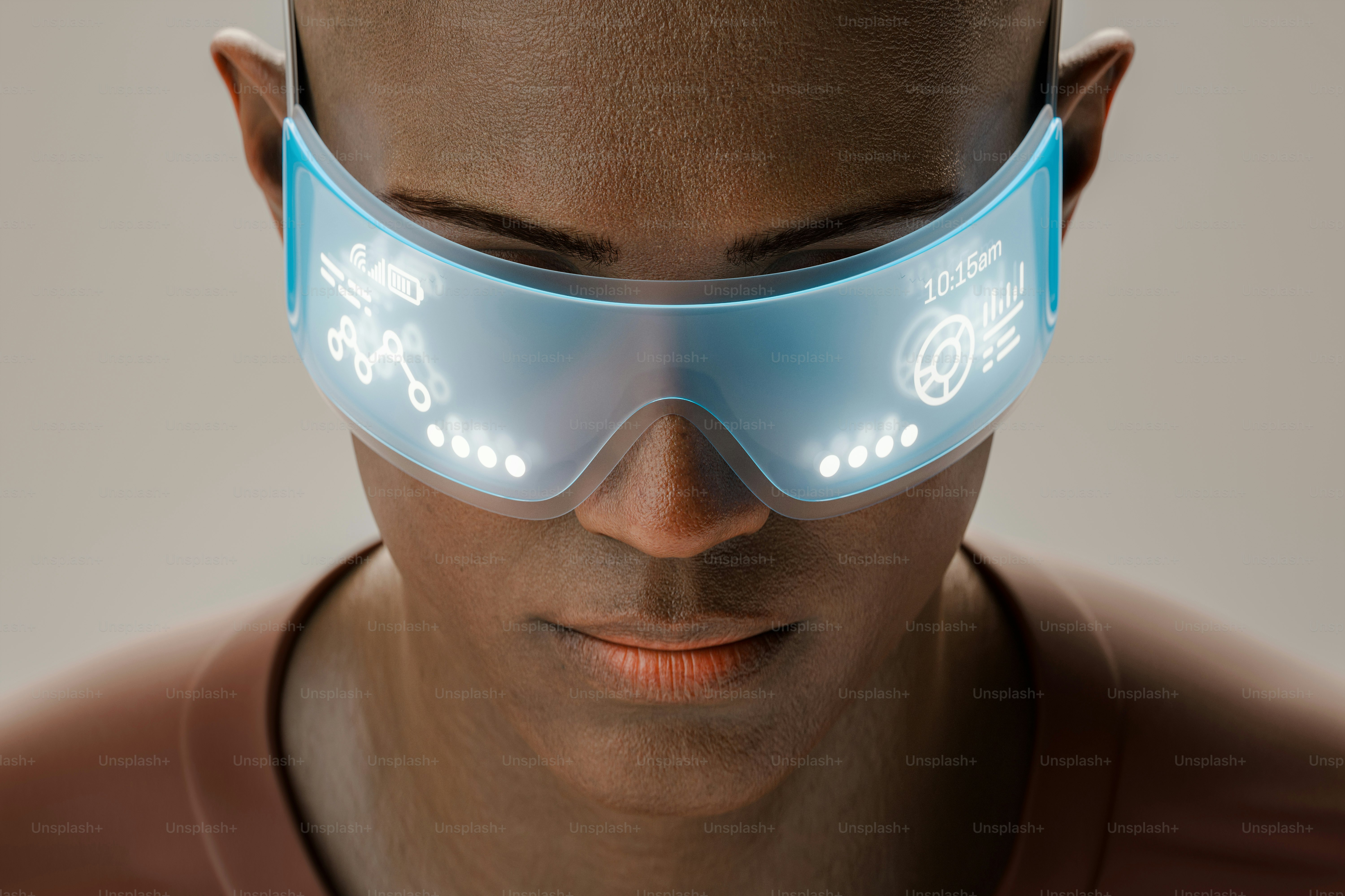A man wearing a blue light up goggles photo – Wallpaper Image on Unsplash