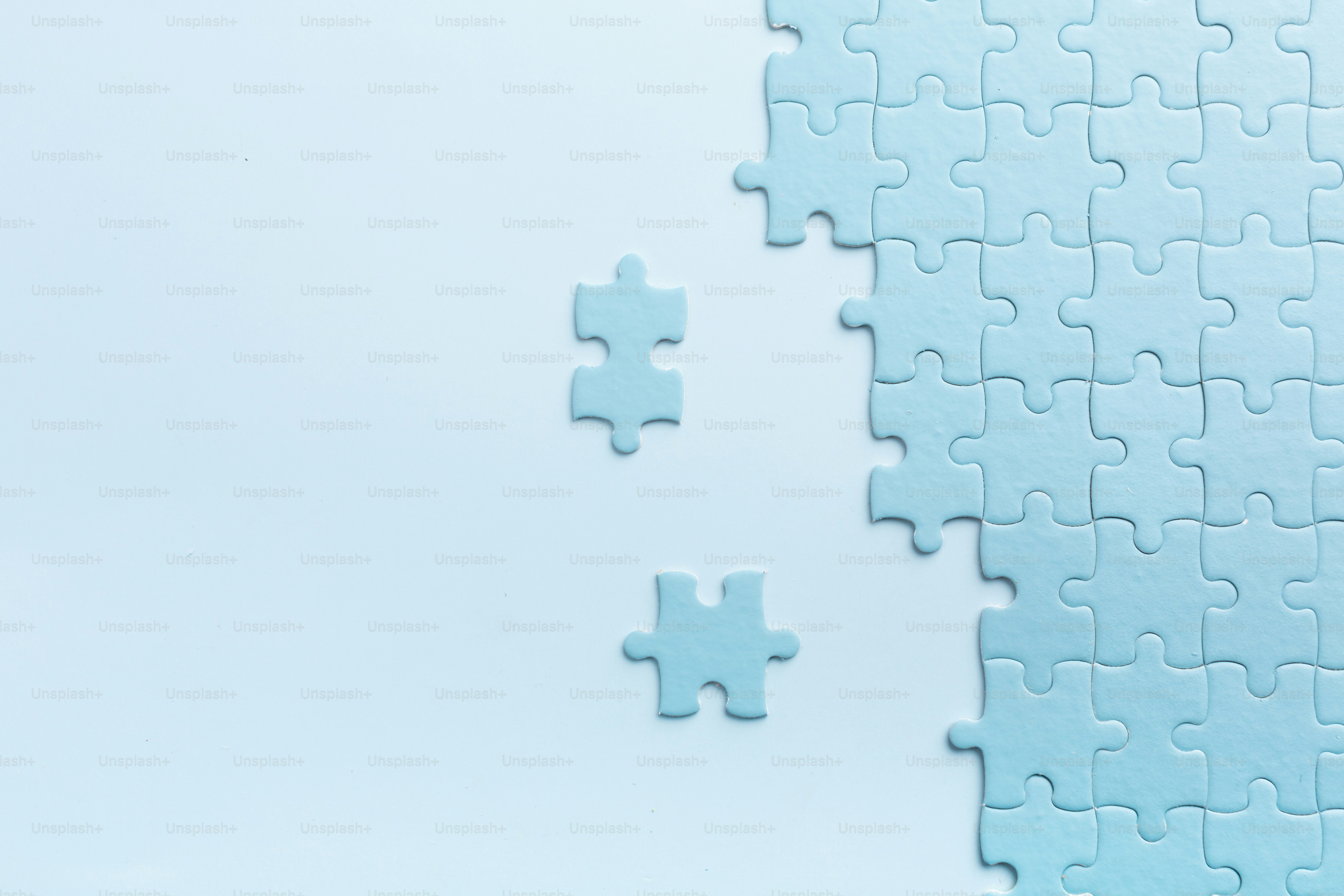 Blue puzzles on both sides with separate elements. High quality photo ...