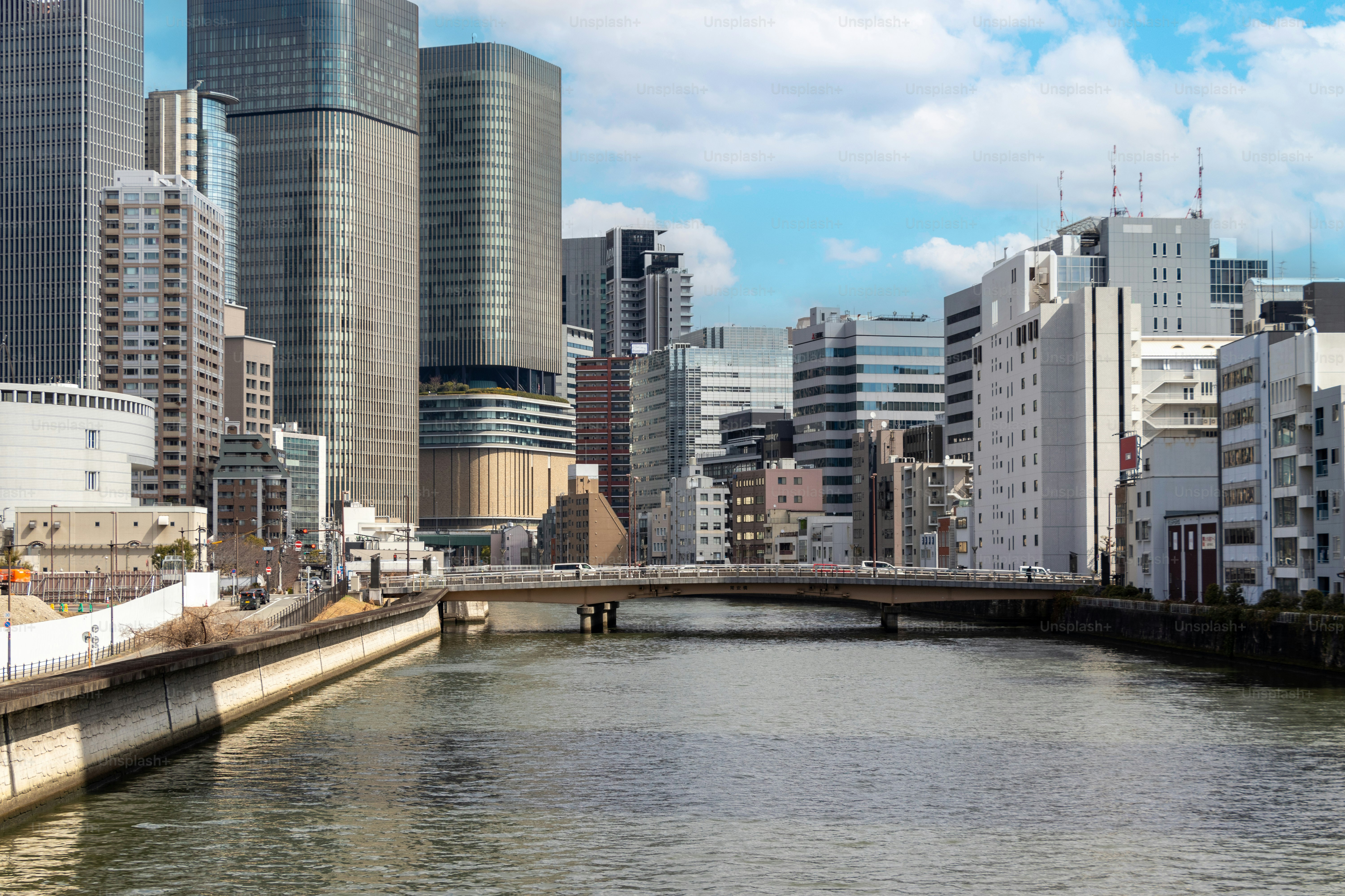 Cityscape of Osaka viewed from the Tosabori River photo – Kita-ku ...