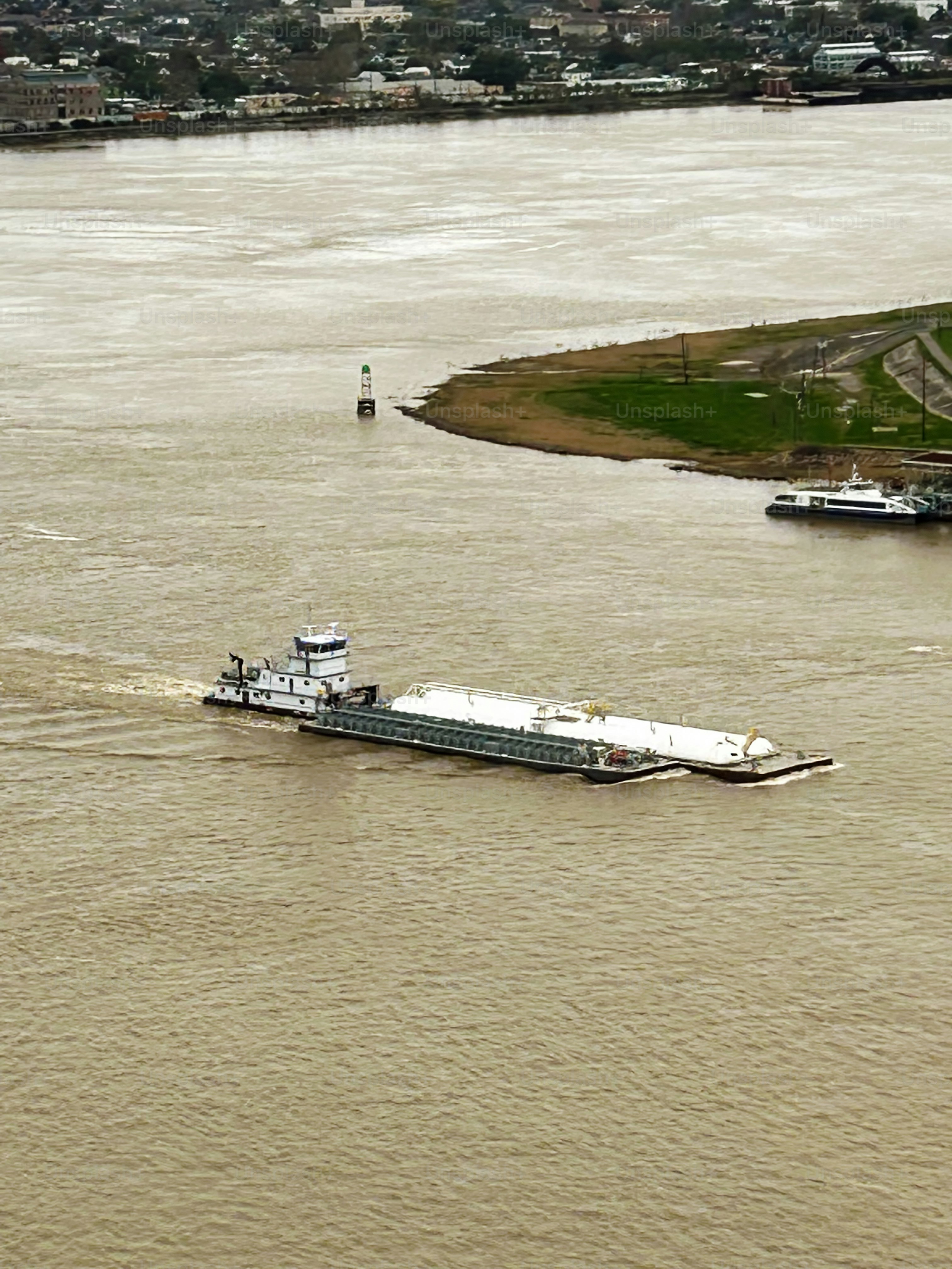 An aerial of River Barge on Mississippi River at New Orleans, Louisiana ...