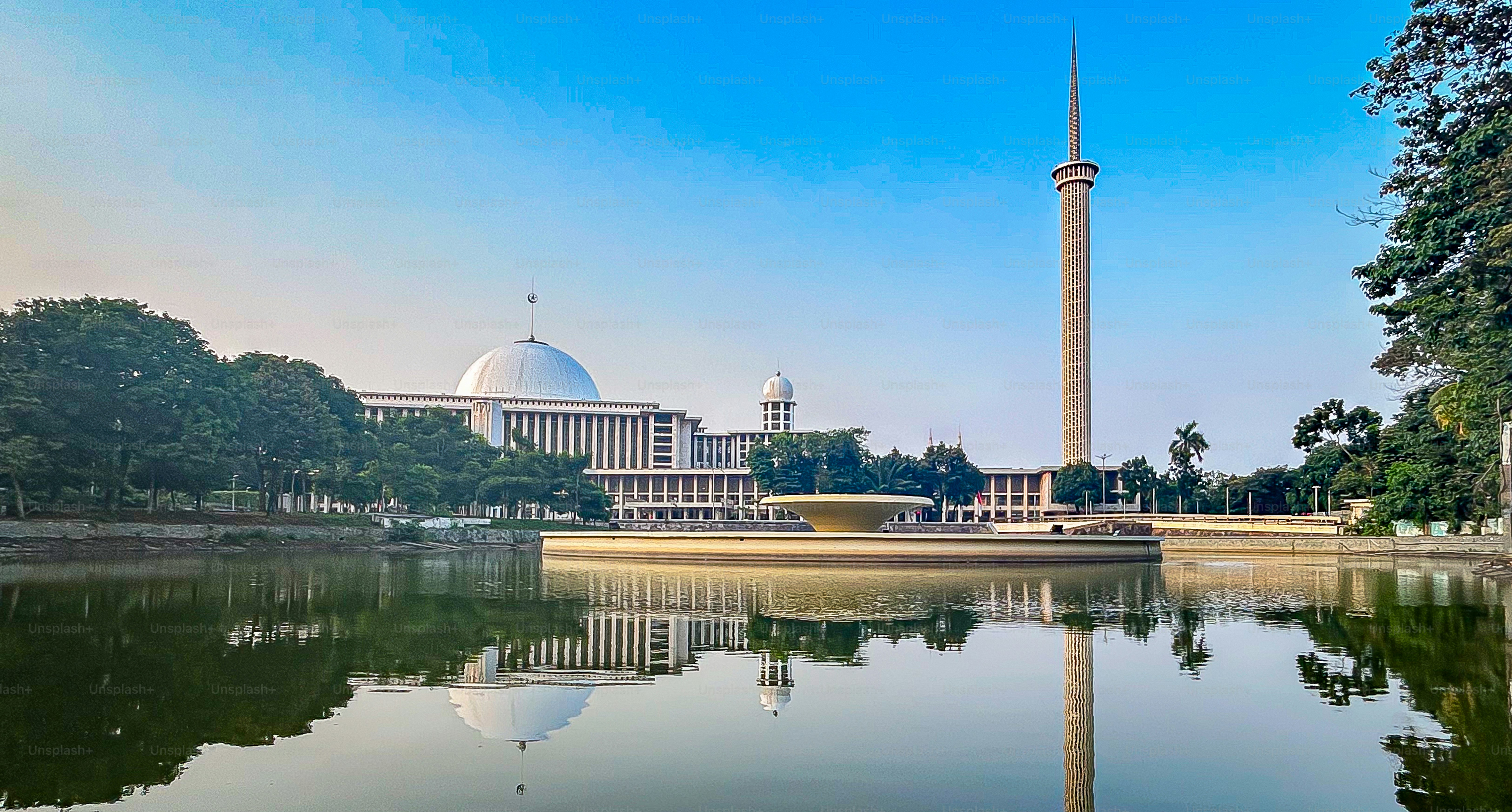 Istiqlal Mosque reflecting in the pond in Jakarta photo – Islamic ...