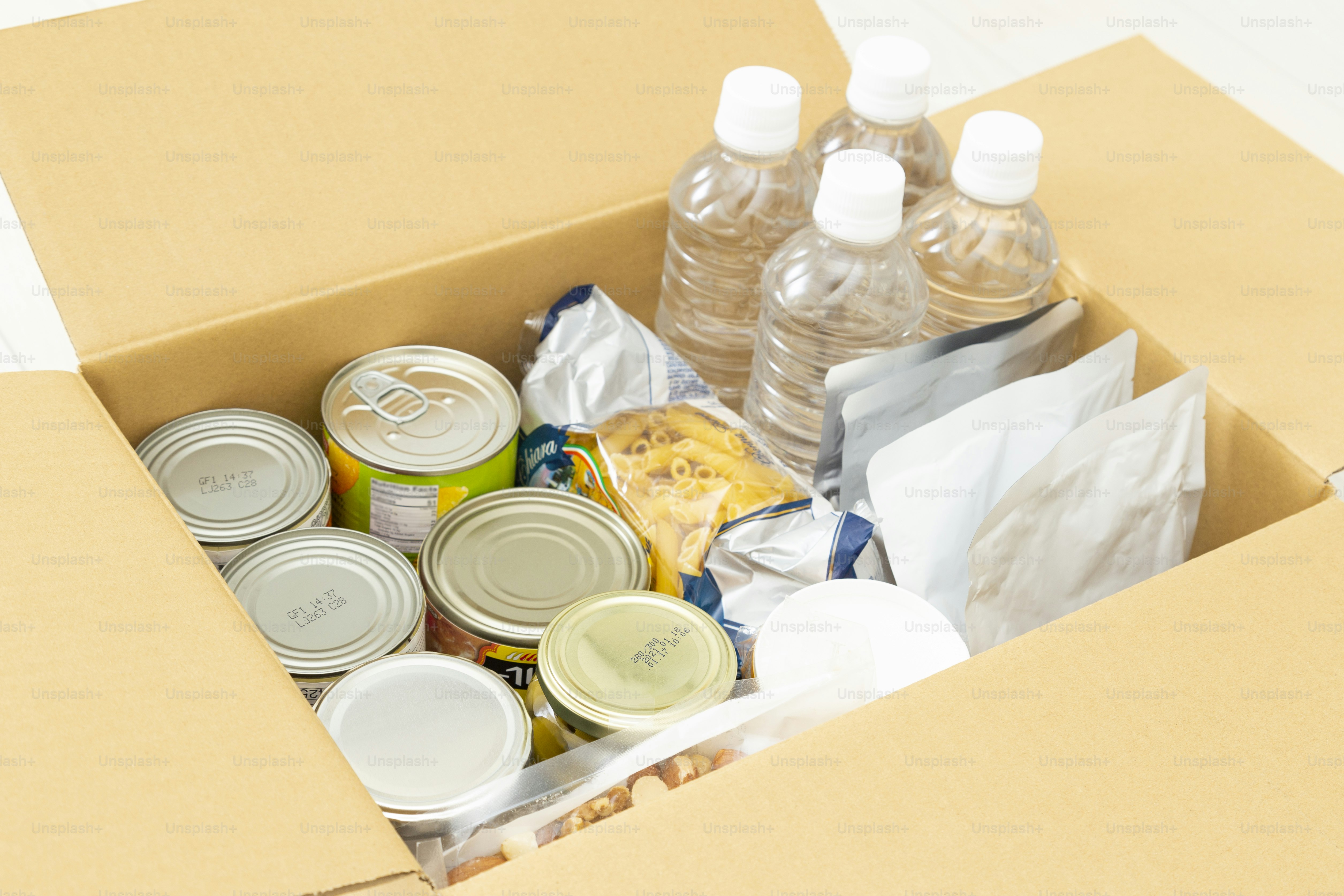 Emergency food stored in cardboard boxes. photo – Food Image on Unsplash