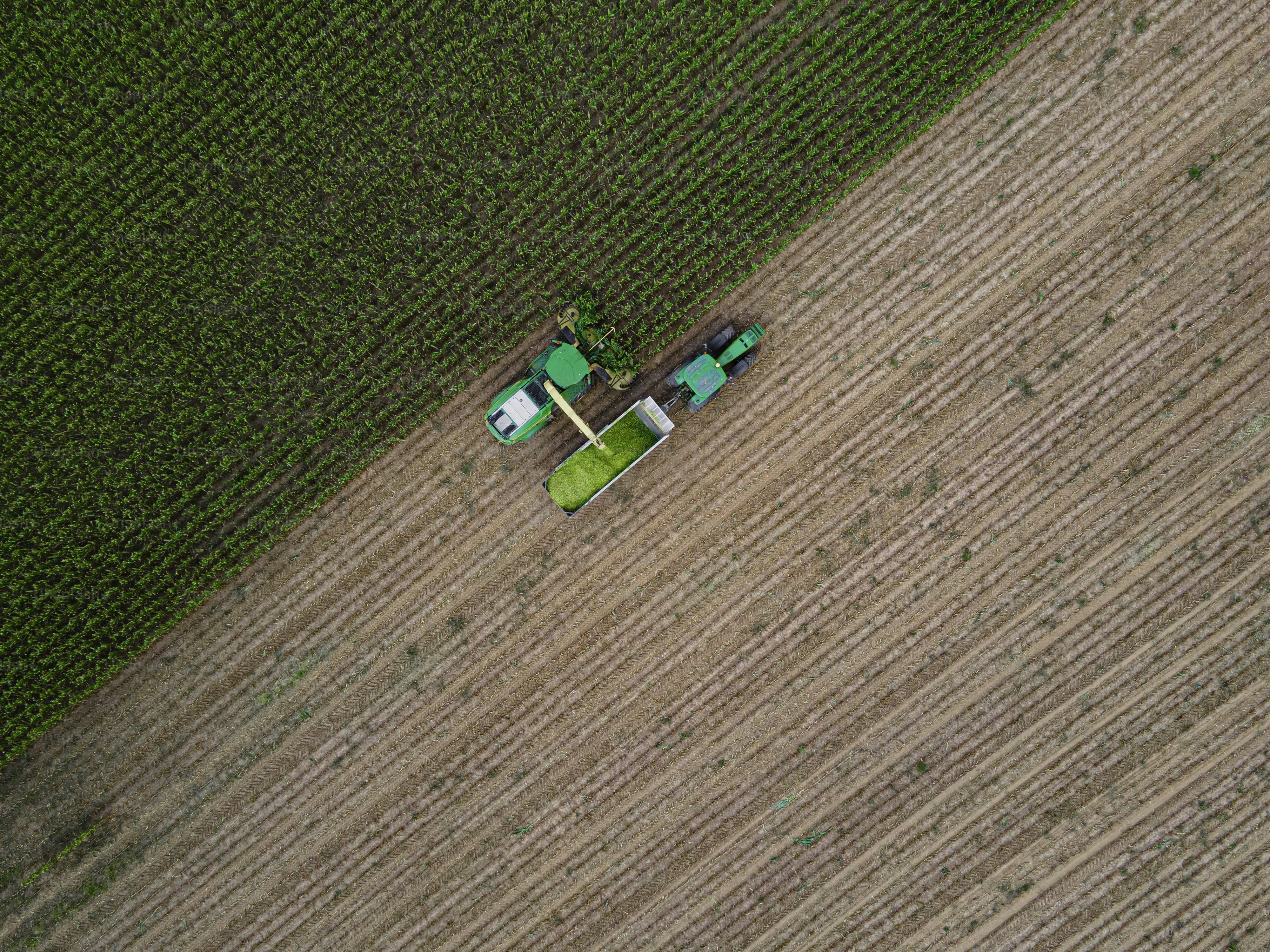 Remote-controlled Ai-enabled combine harvester and tractor trailer ...