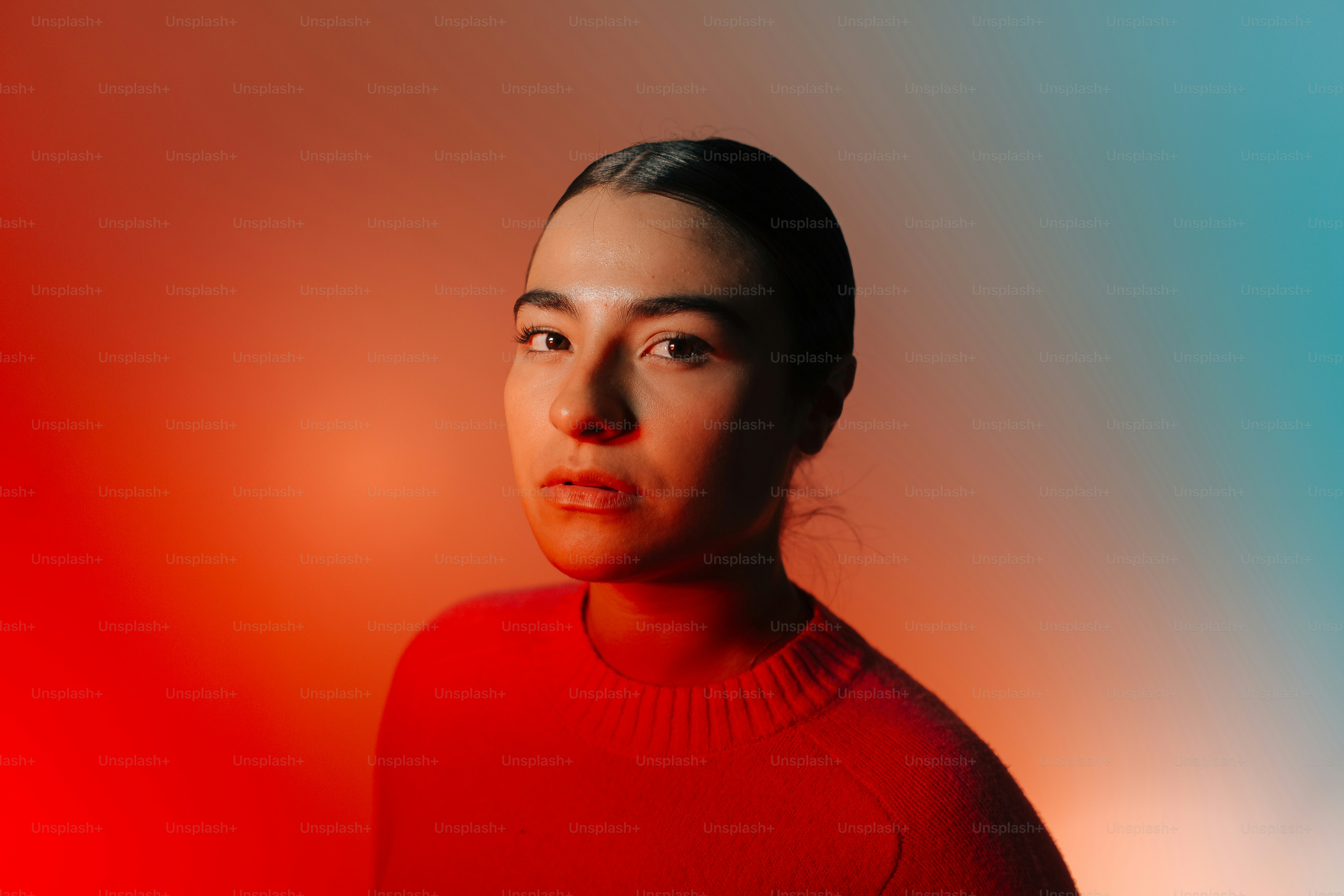 A woman in a red sweater posing for a picture photo – Portrait Image on ...