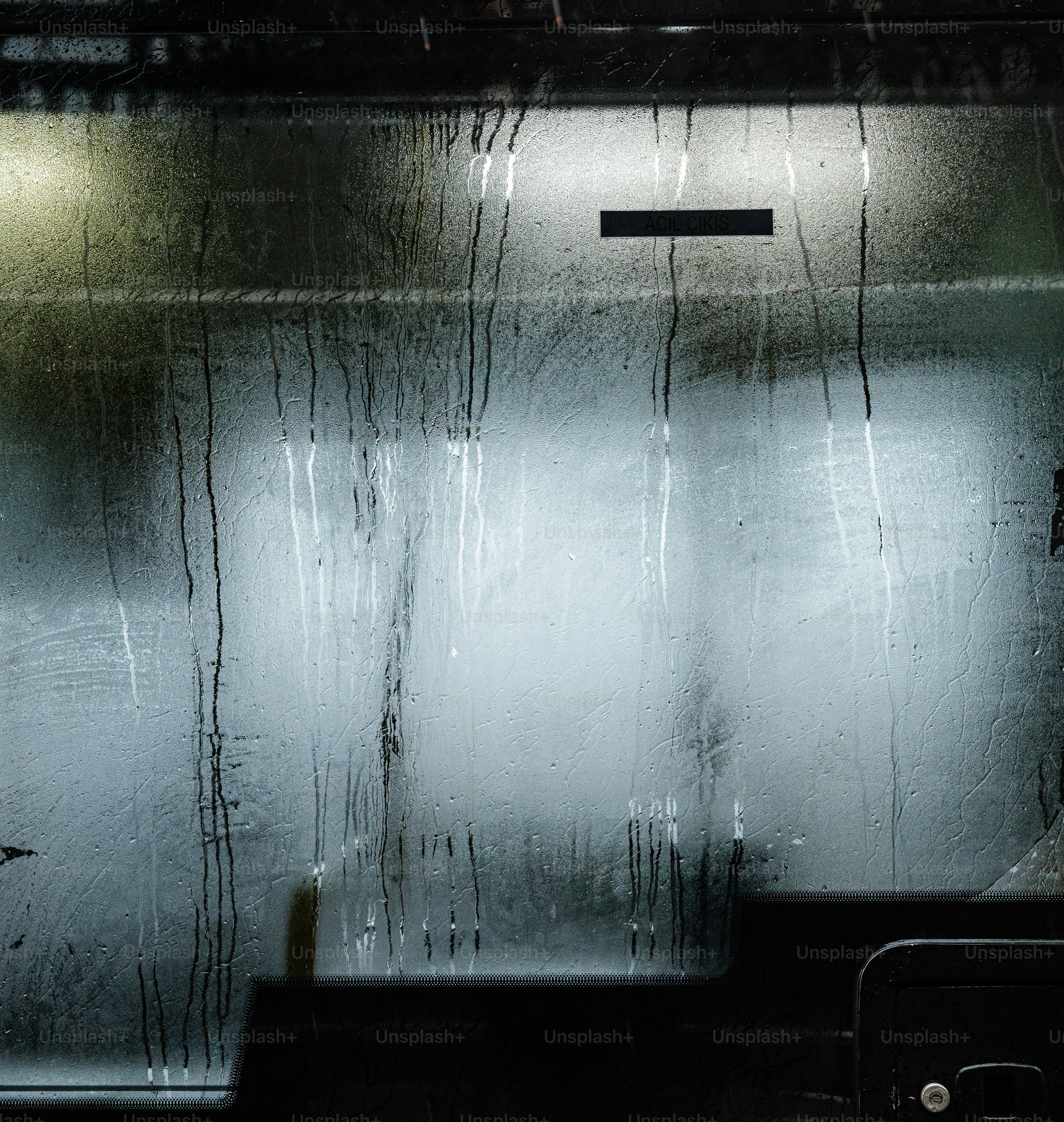 A bathroom with a toilet and a mirror photo – Condensation Image on ...