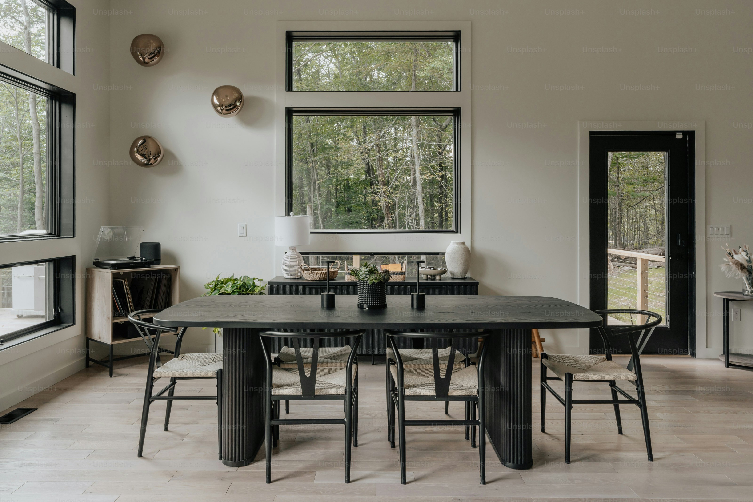 A dining room with a table and chairs photo – Dining table Image on ...