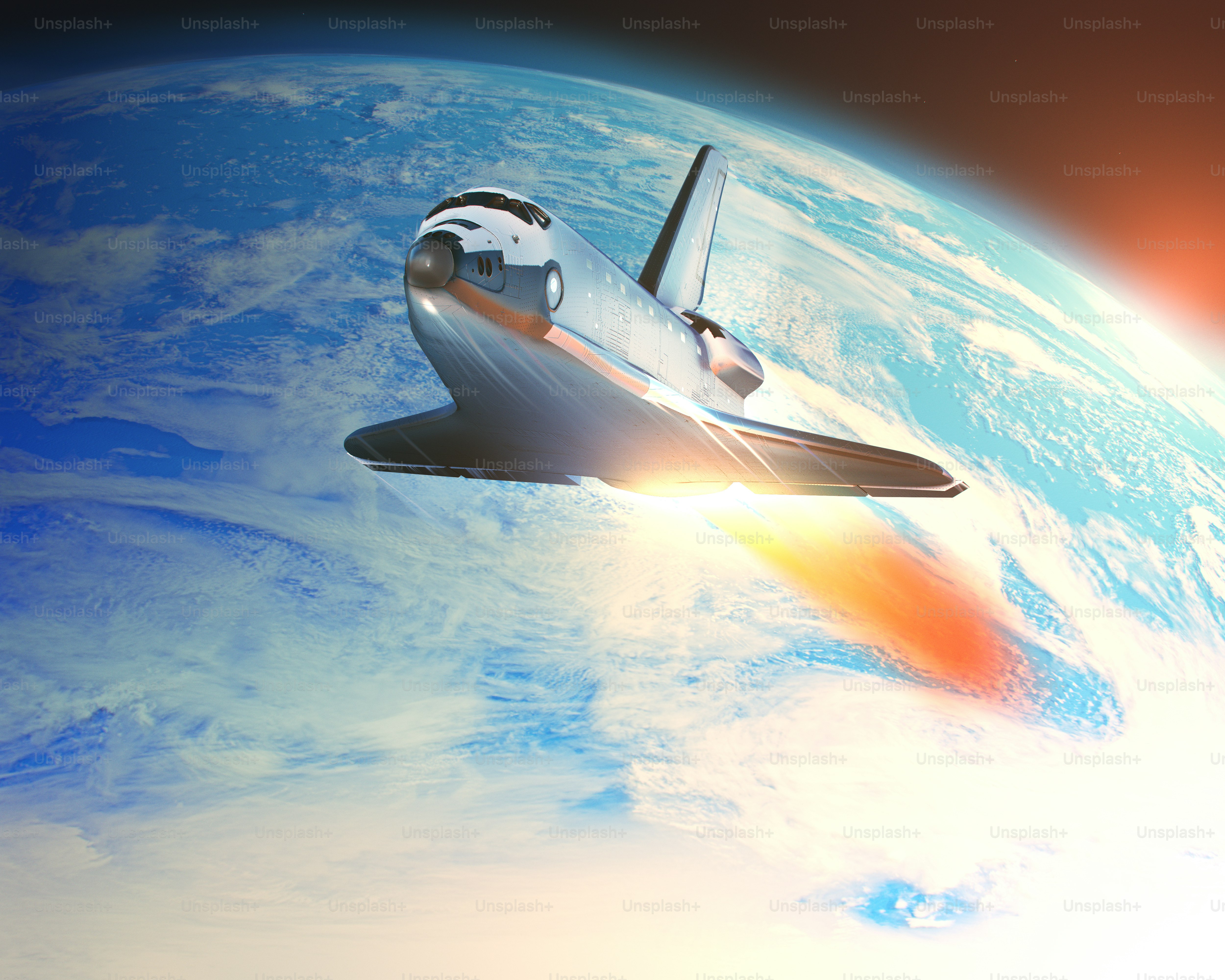 A space shuttle flying over the earth photo – Rocket Image on Unsplash