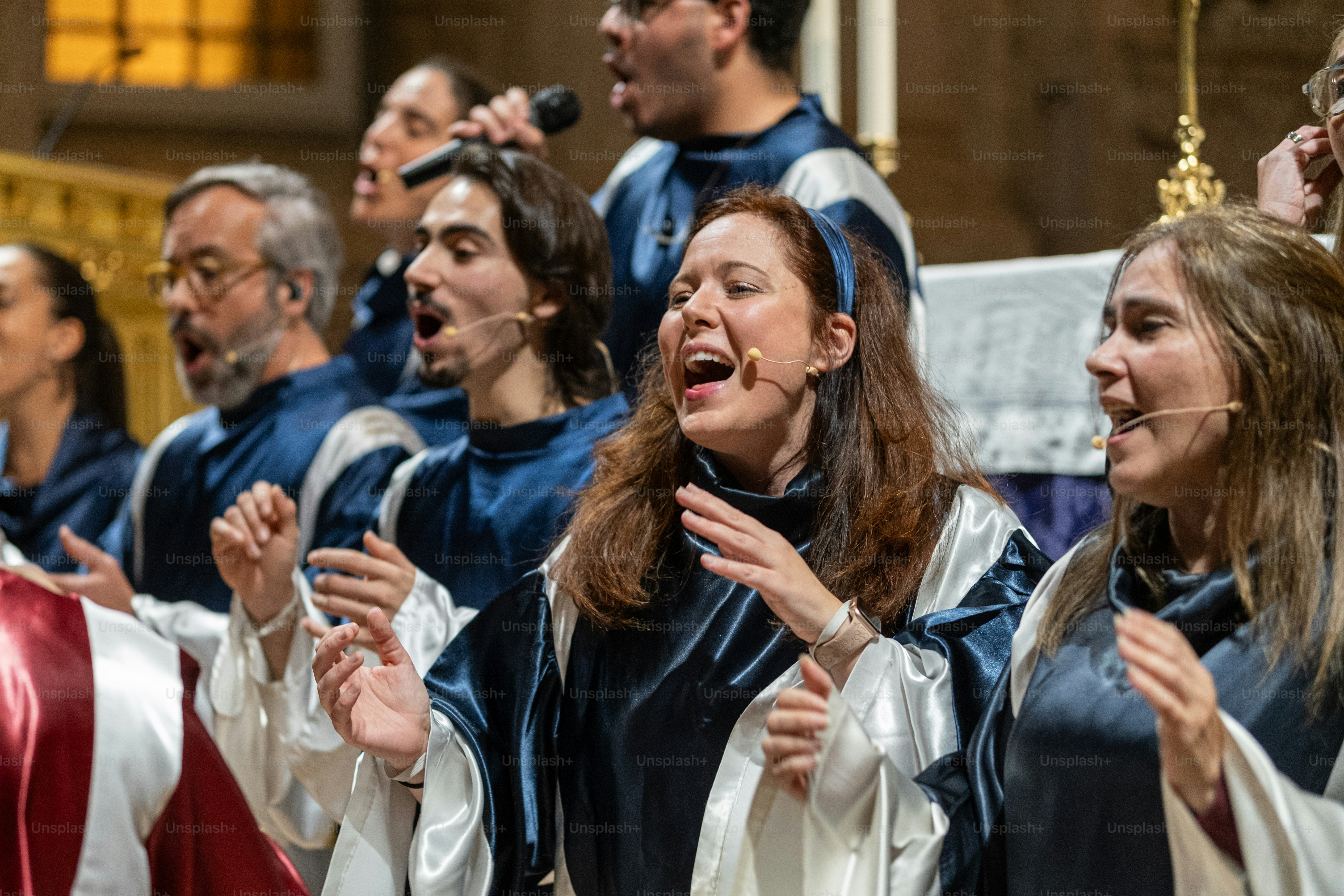 A group of people standing next to each other photo – Church choir ...