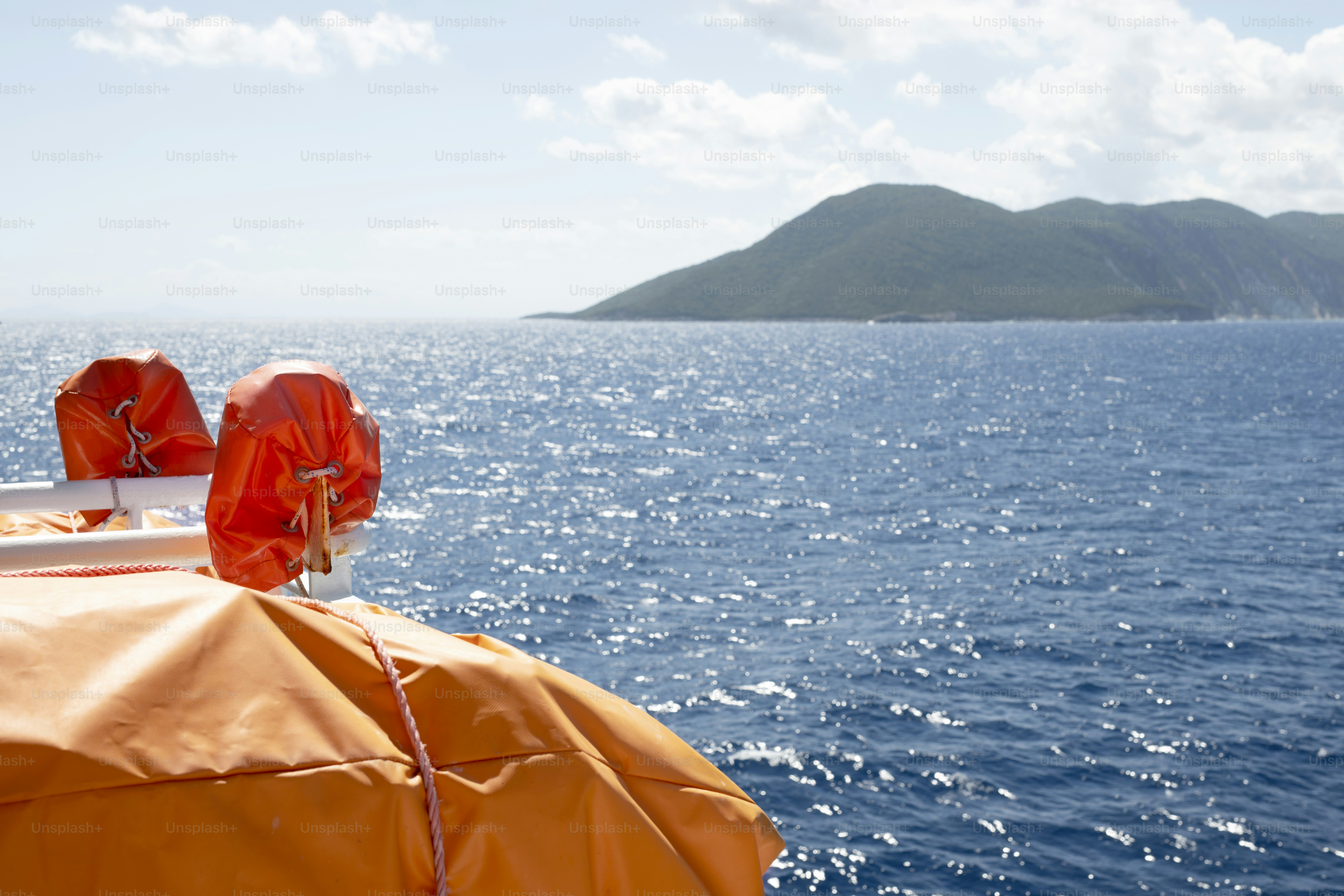 A view of the back of a boat from the deck photo – Sea Image on Unsplash