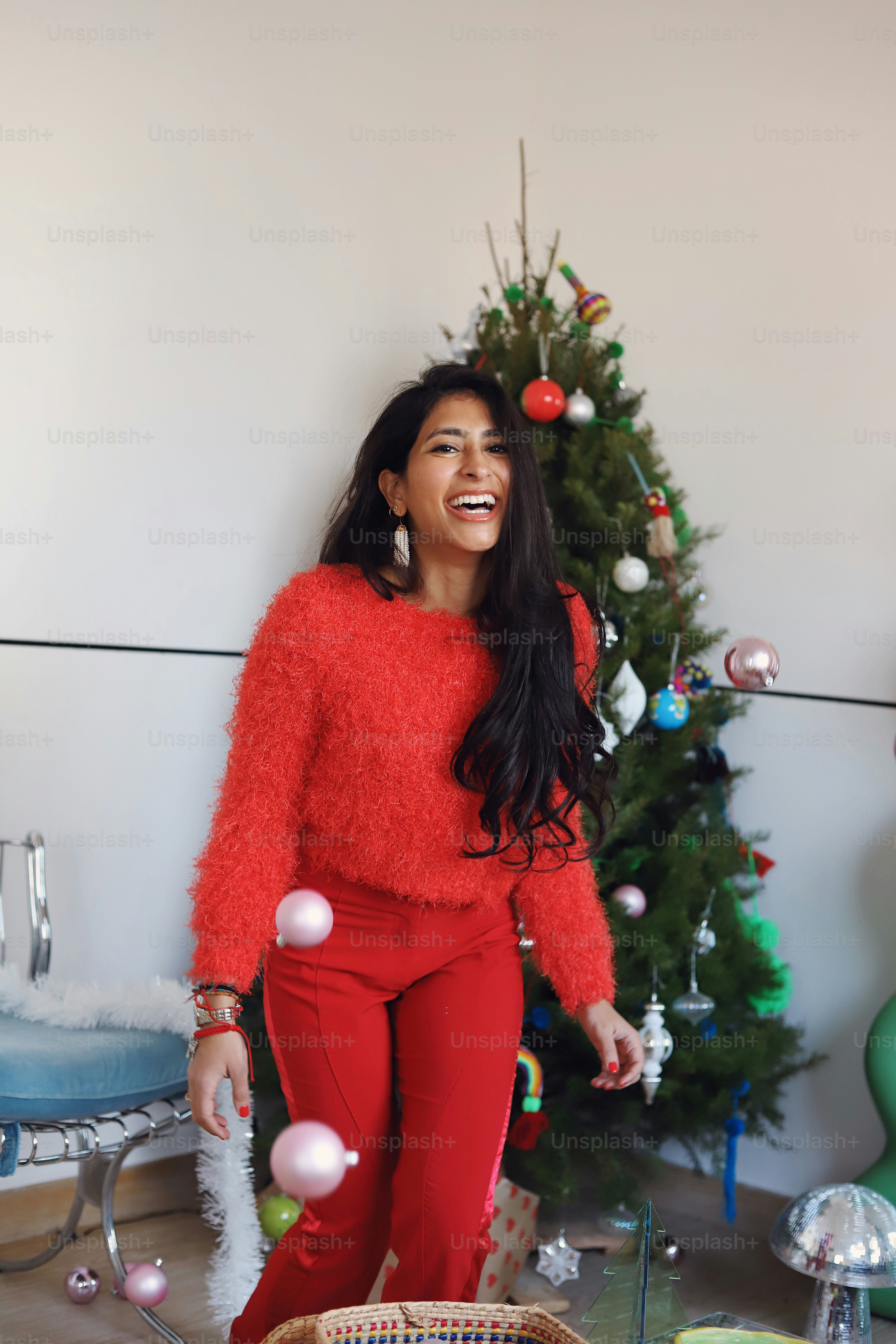 A woman sitting on the floor with balls in front of her photo – Model ...