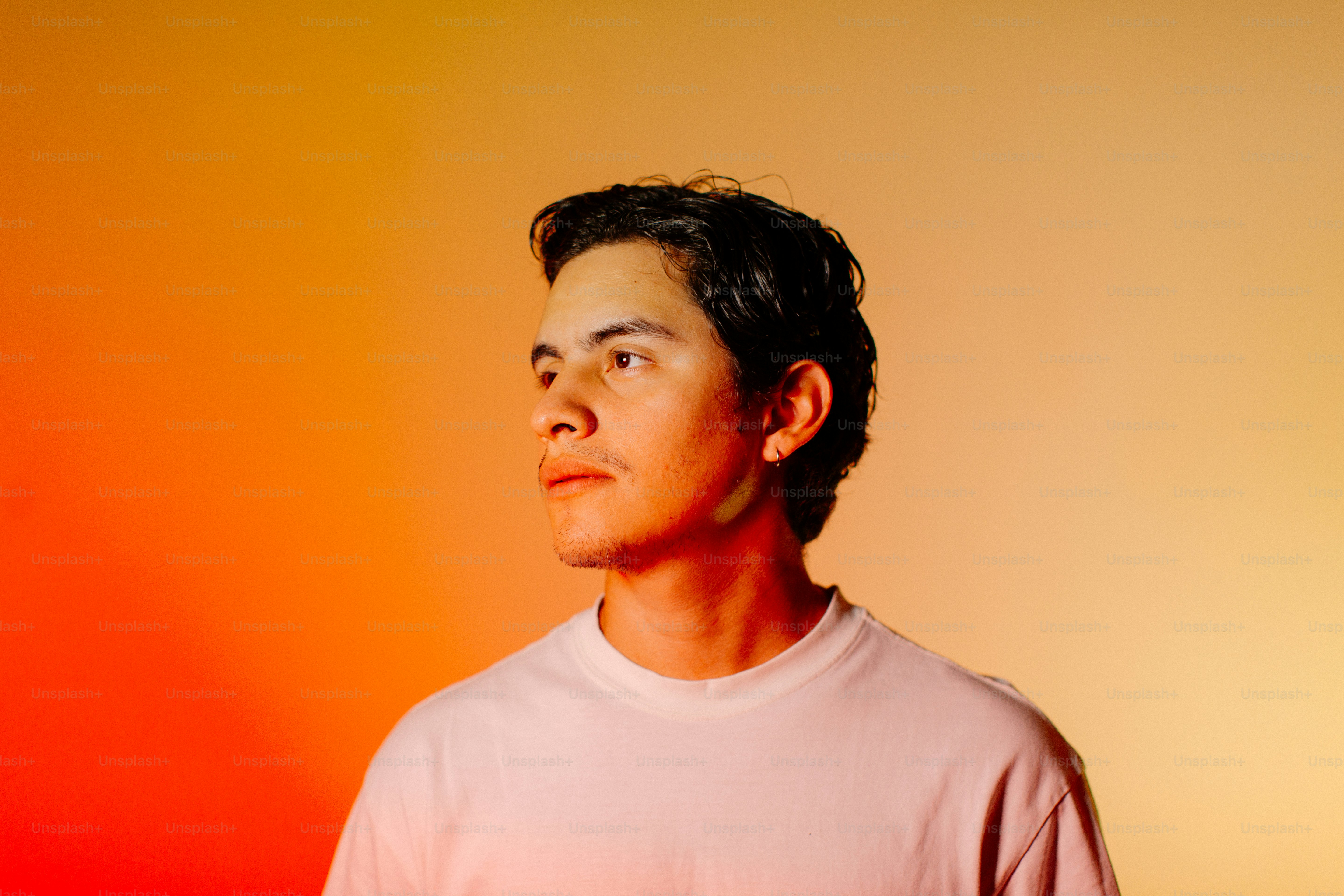 A man standing in front of a colorful background photo – Portrait Image ...