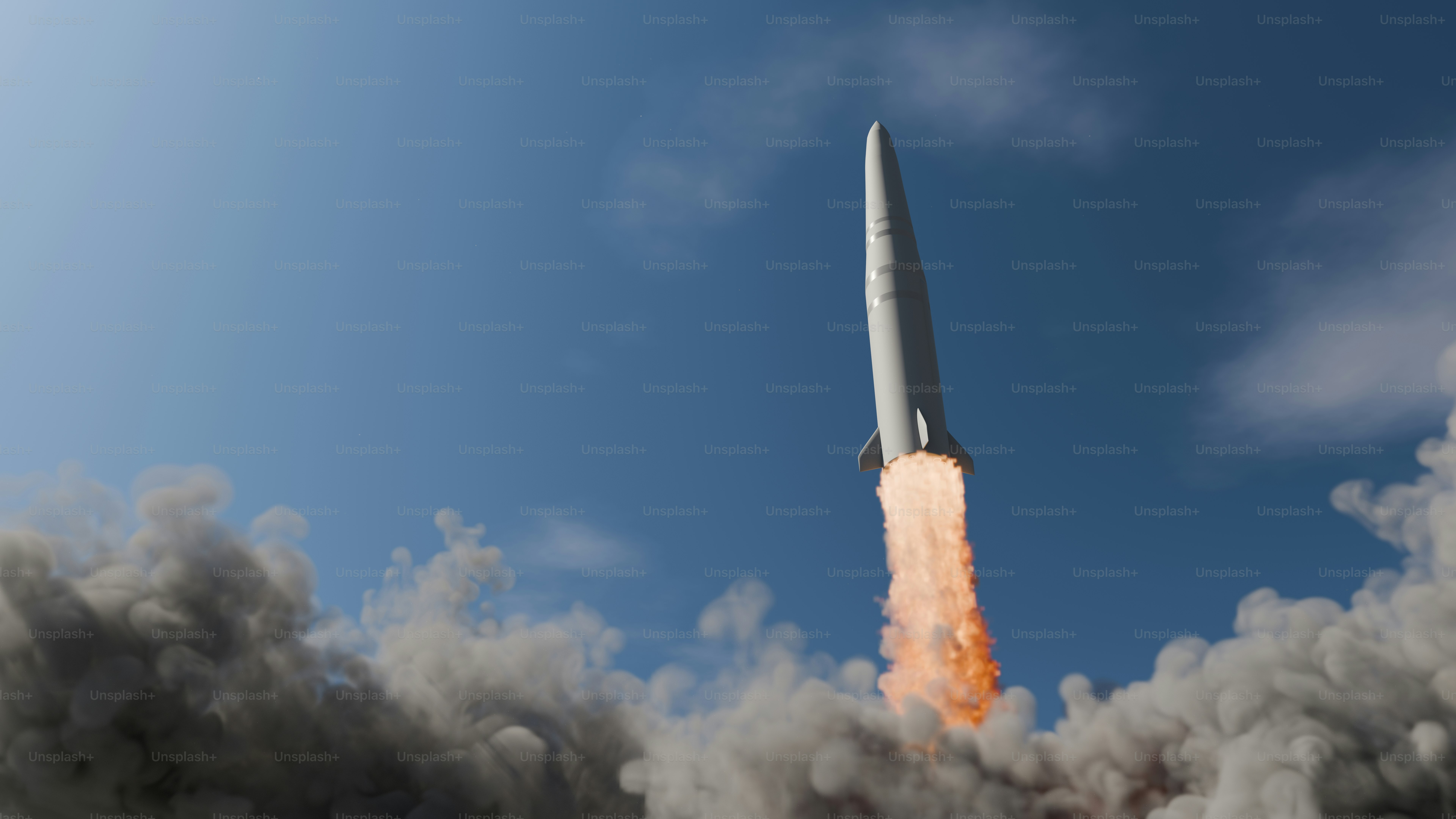 A rocket launching into the sky with smoke billowing out of it photo ...