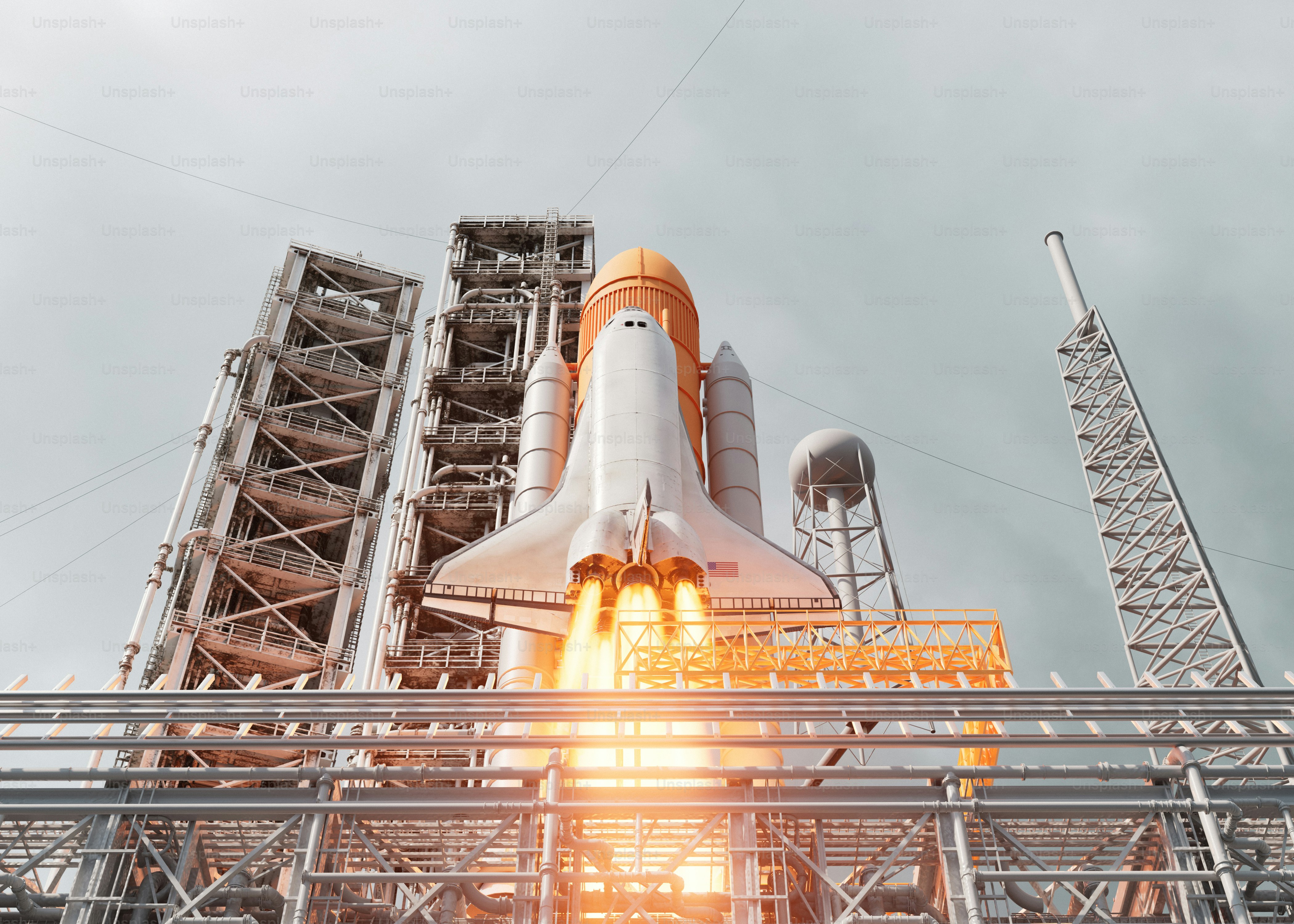 A space shuttle is on display at the launch pad photo – Rocket launch ...