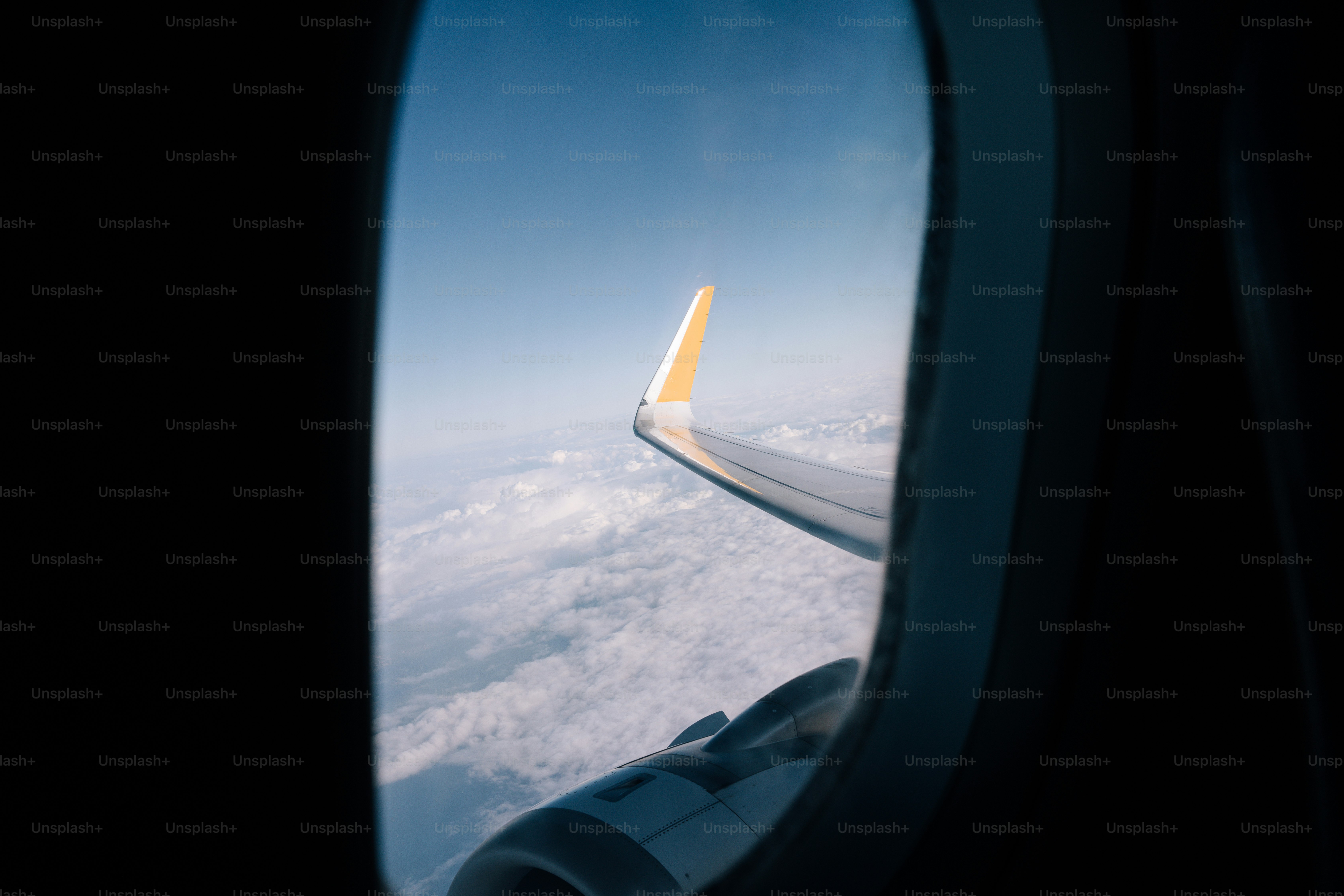 A view of the wing of an airplane through a window photo – Travel Image ...