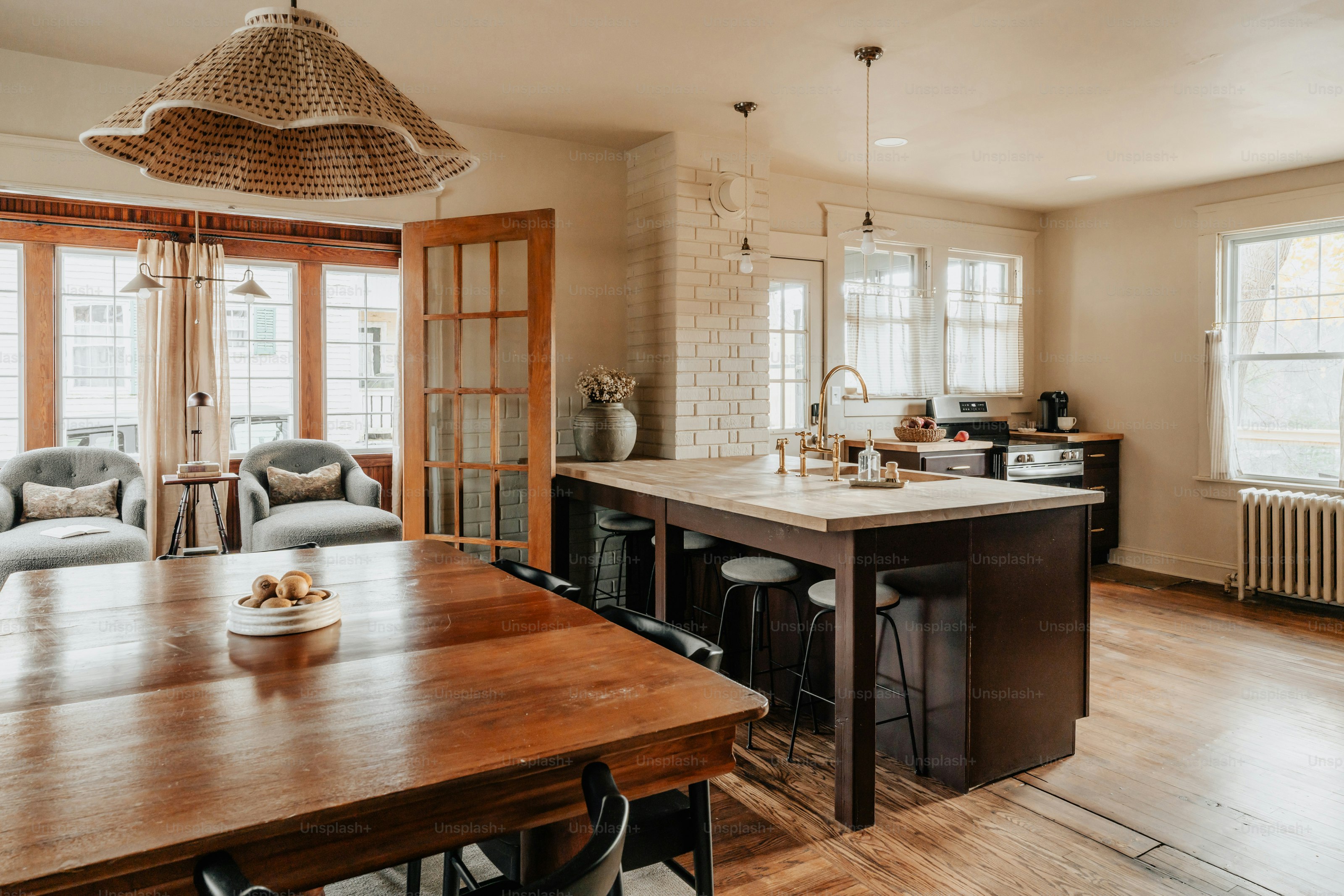 A large open kitchen and living room area photo – Breakfast room Image ...