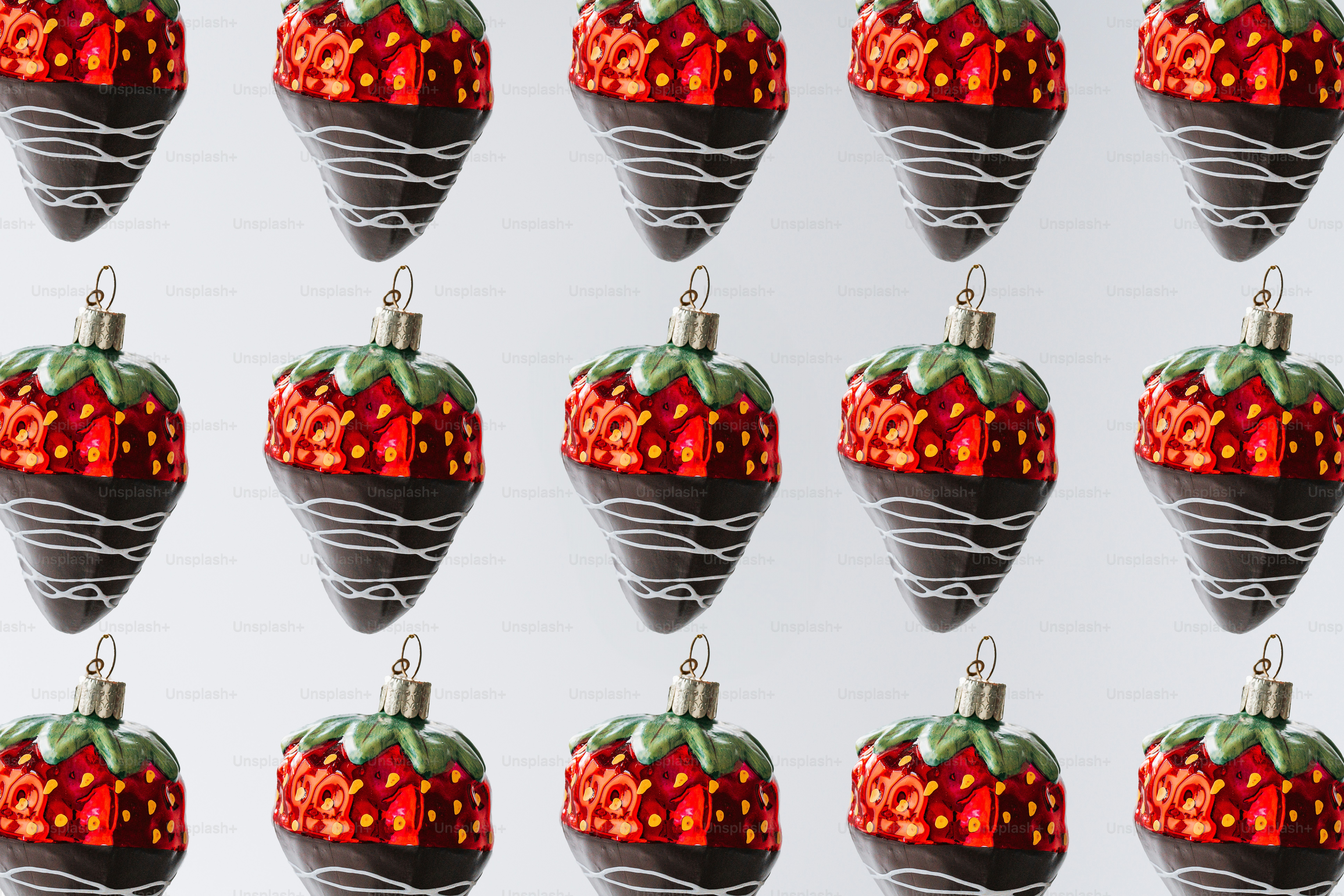 A bunch of strawberries hanging from a string photo – Christmas ...