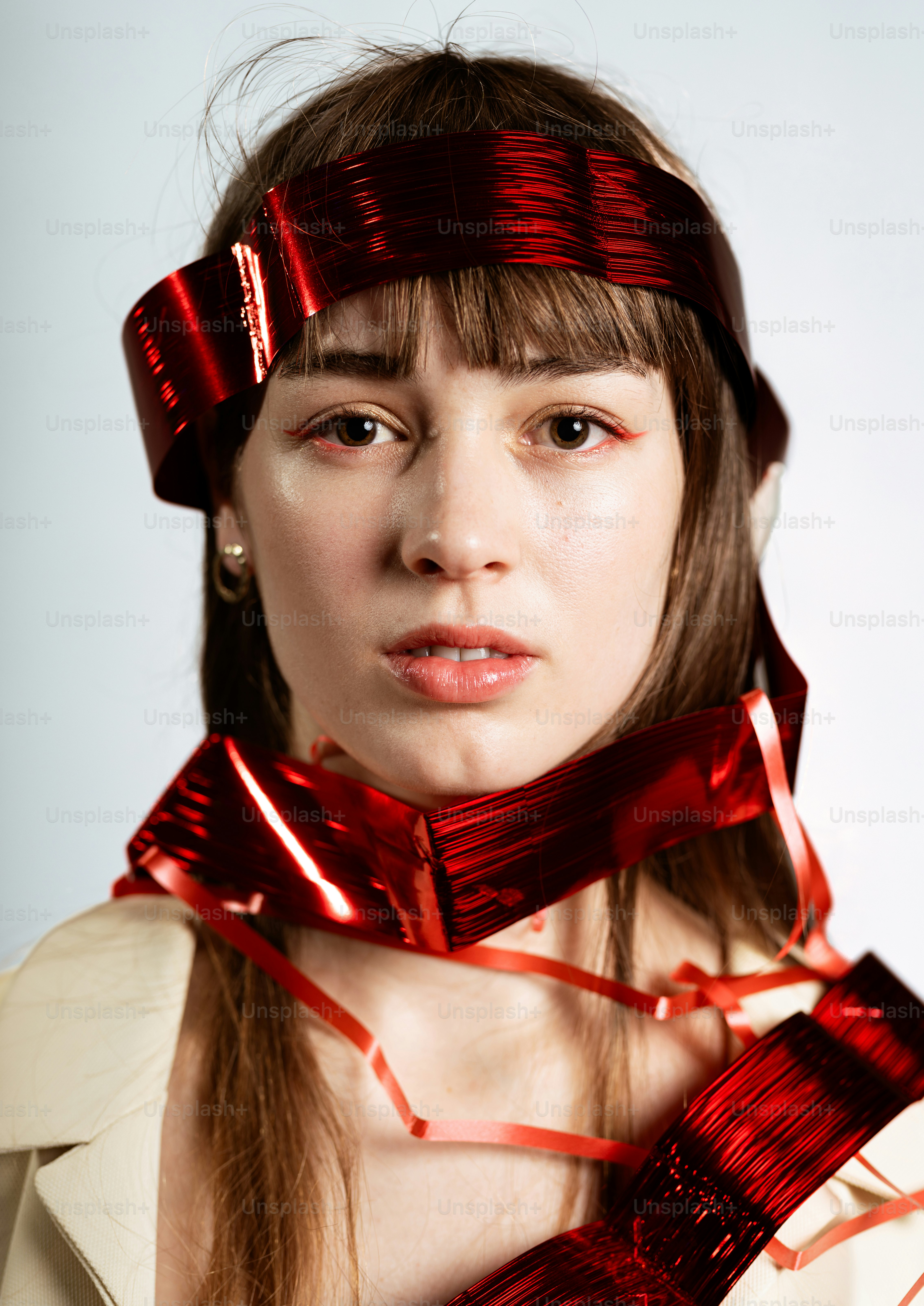 A woman wearing a red ribbon around her neck photo – Fashion Image on ...