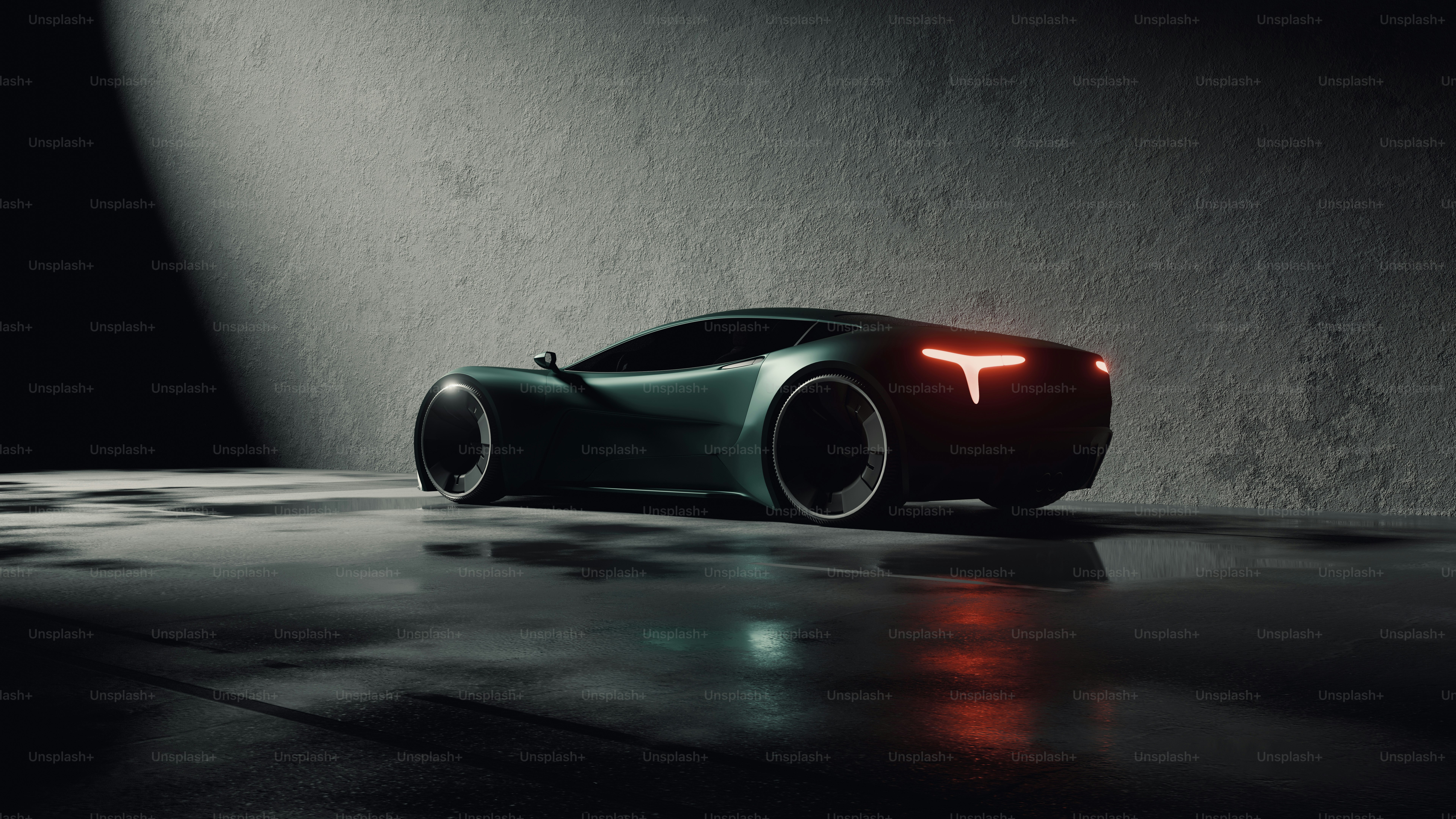 A futuristic car in a dimly lit room photo – Concept car Image on Unsplash