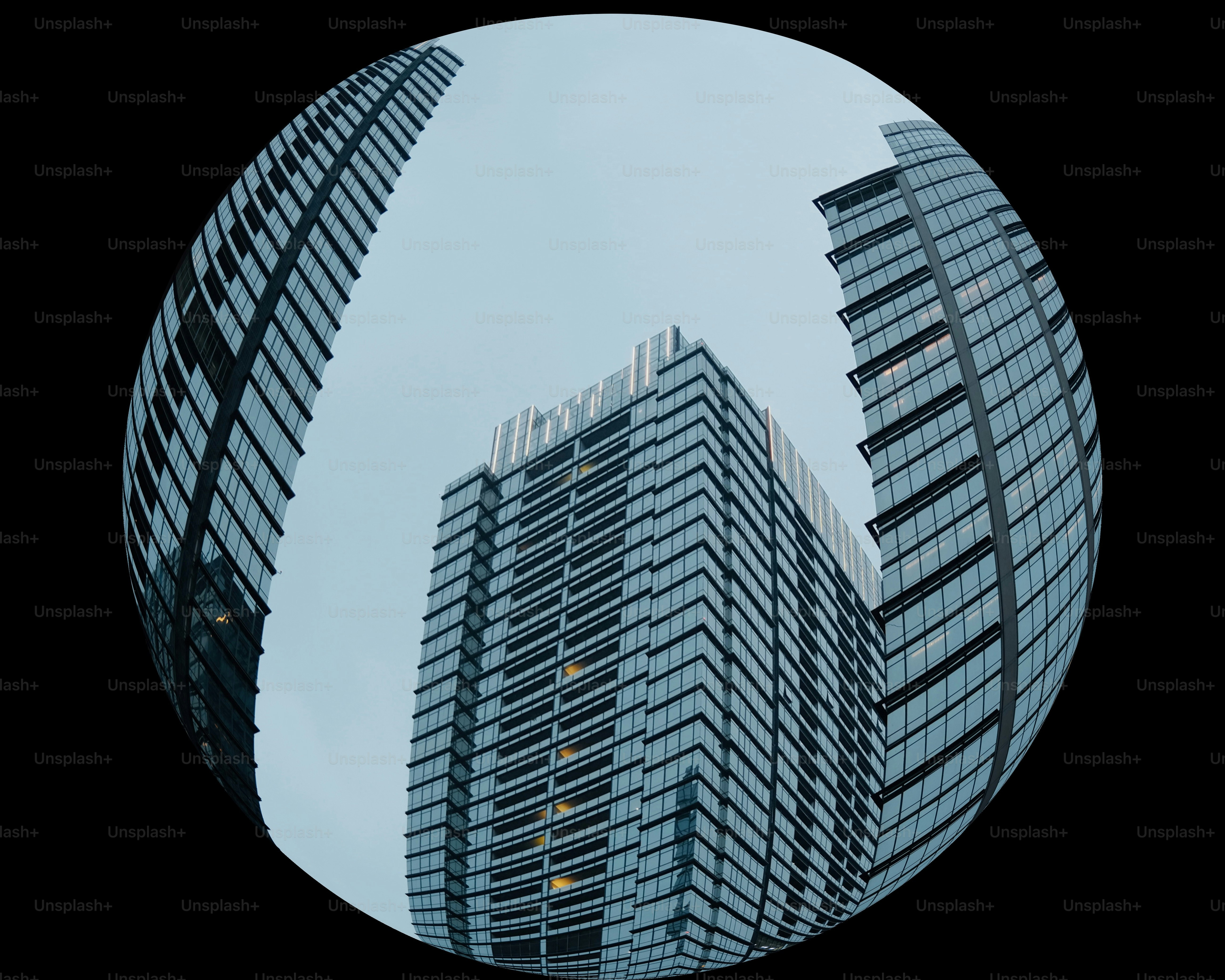 A circular picture of a city with tall buildings photo – Building Image ...