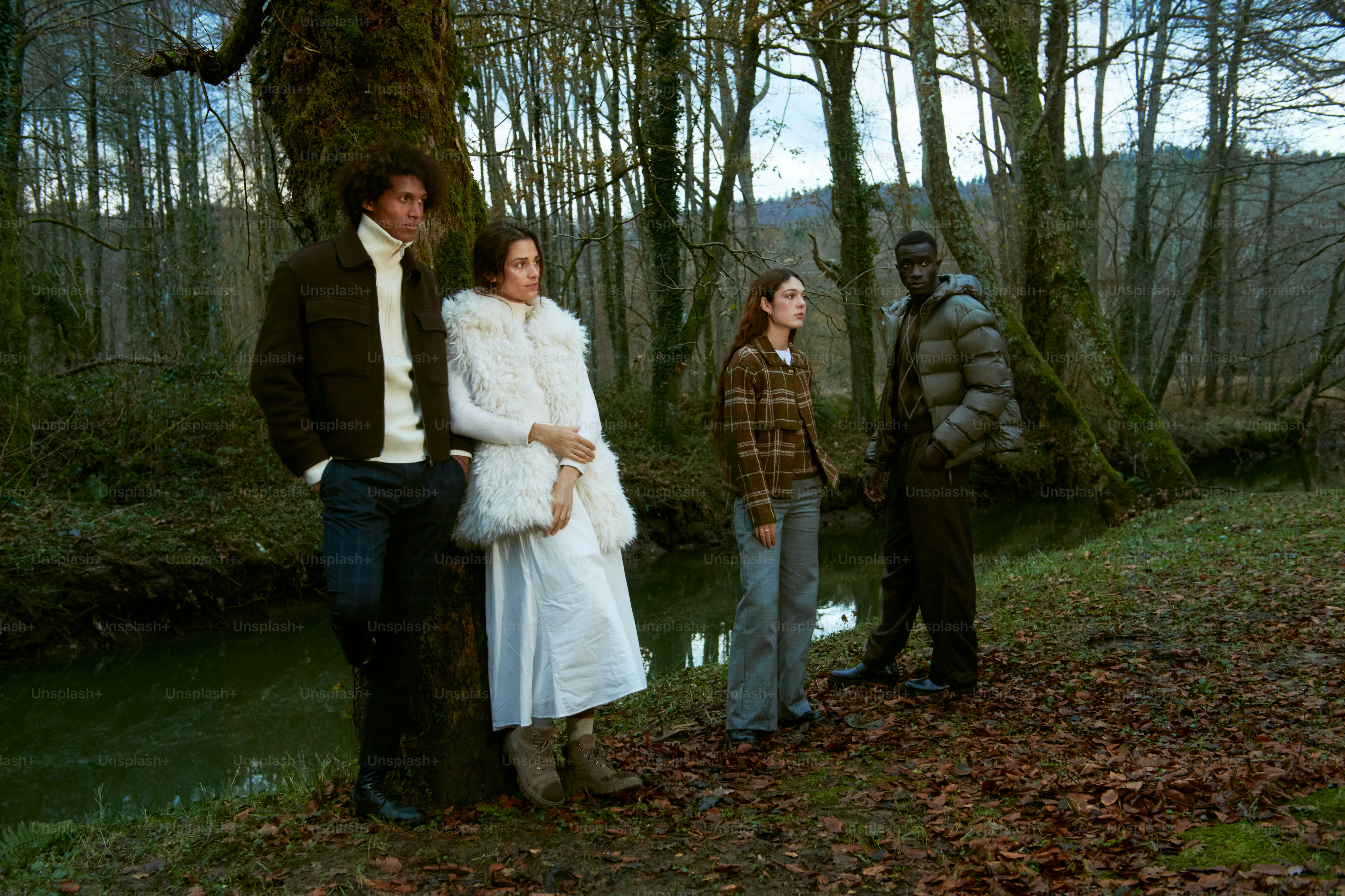 A couple of people standing next to a tree photo – Hiking in style ...