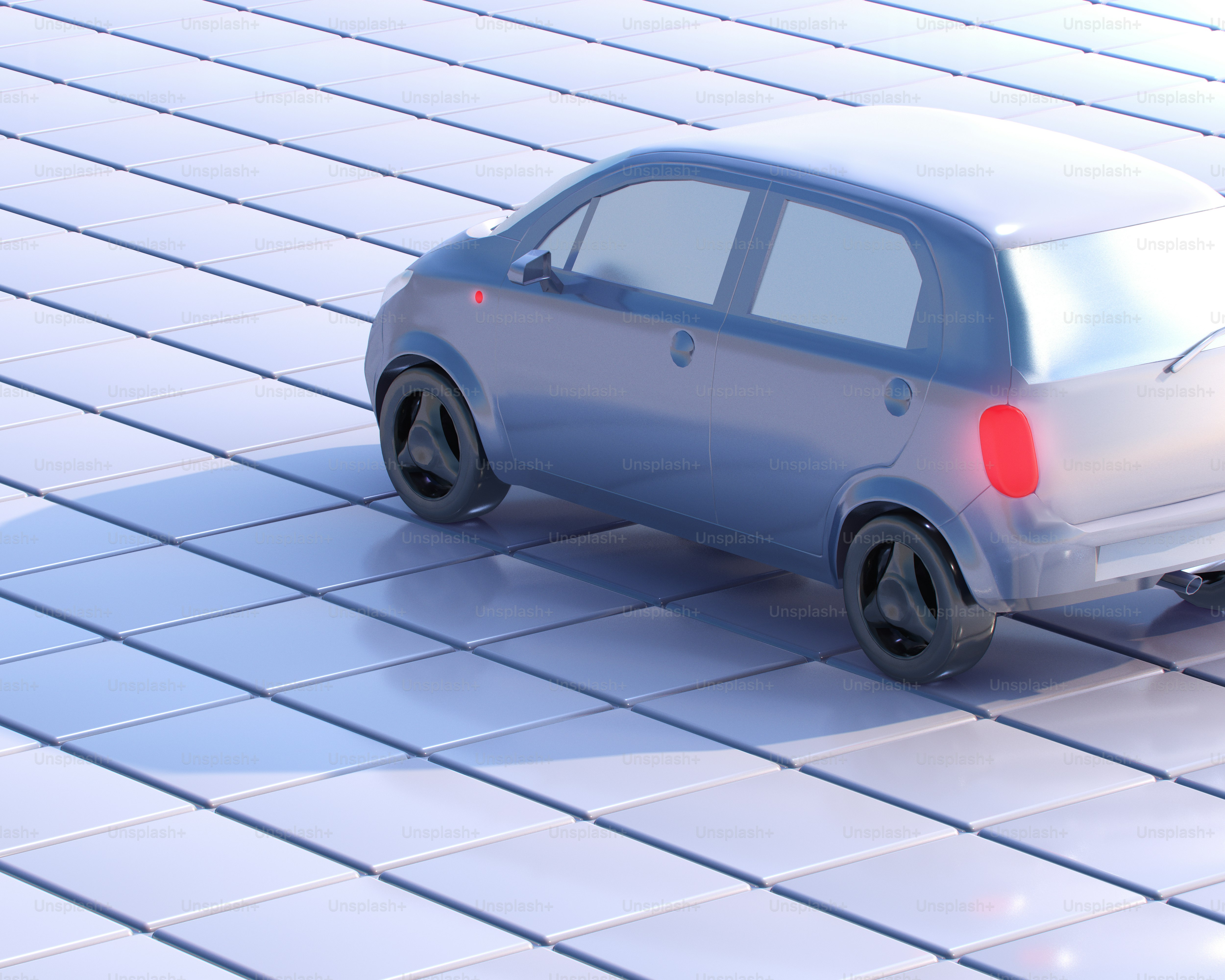 A small car parked on top of a tiled floor photo – Cars Image on Unsplash