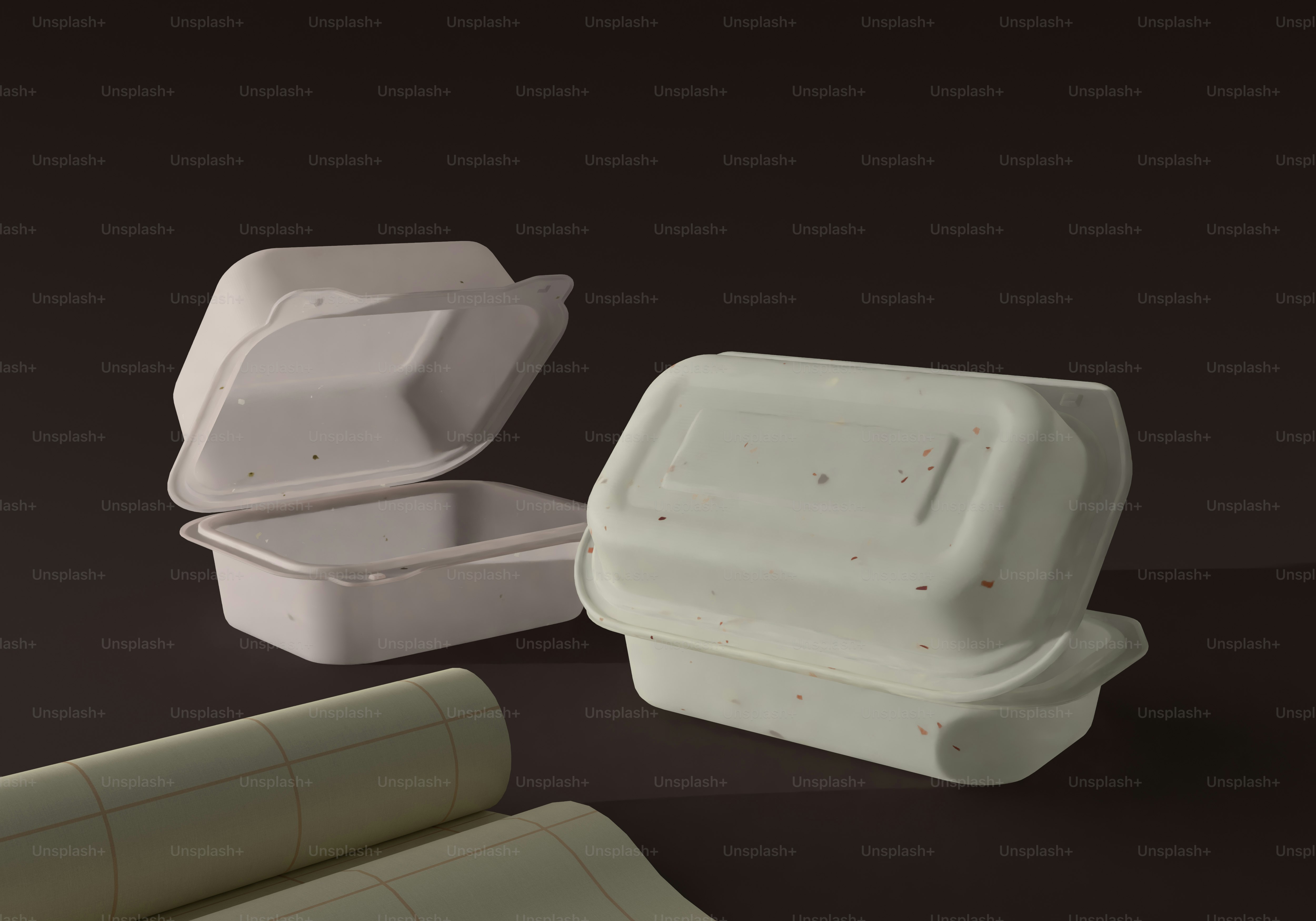A group of white containers sitting on top of a table photo ...