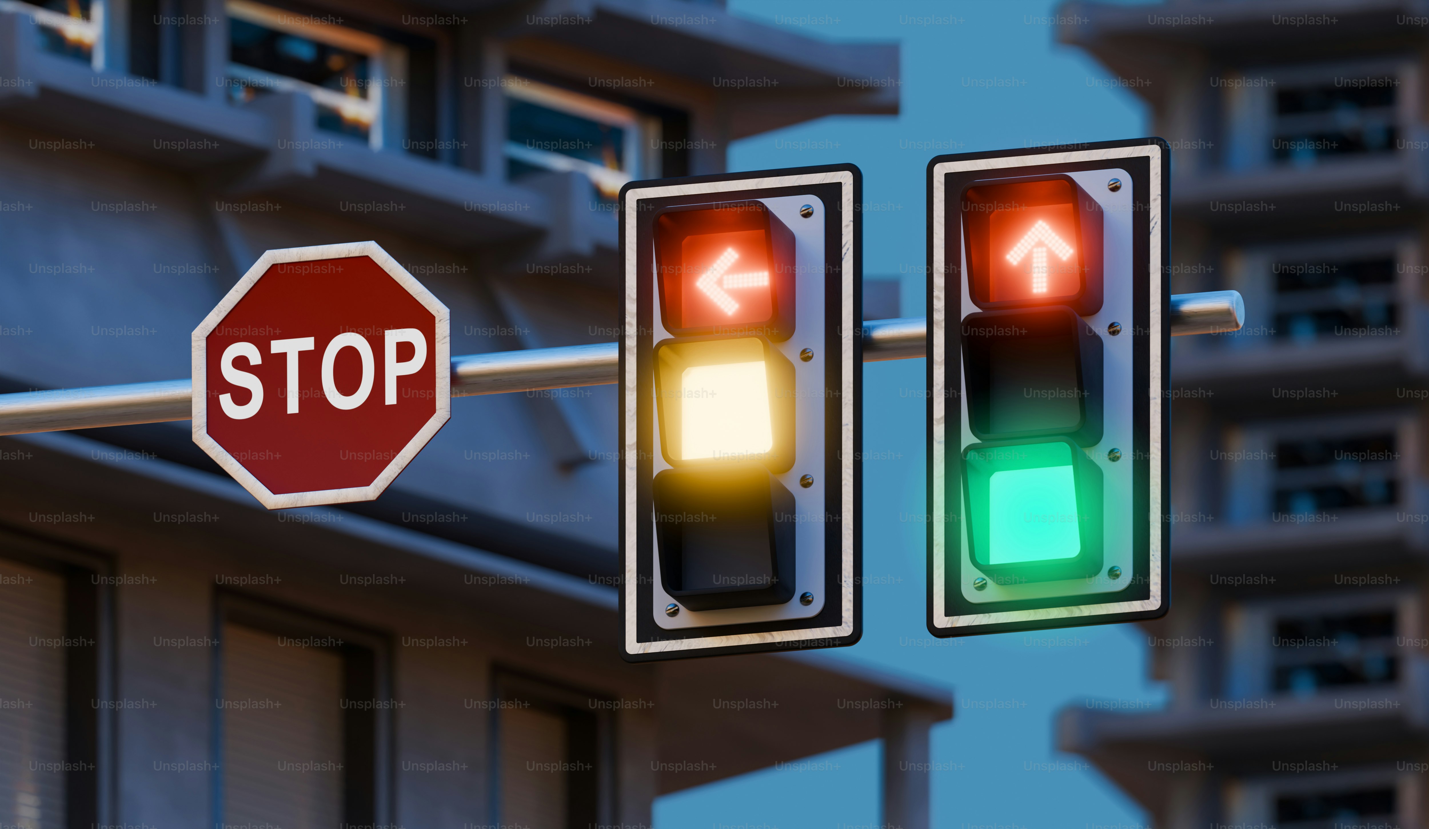 Una señal de stop y un semáforo delante de un edificio foto – Imagen de ...