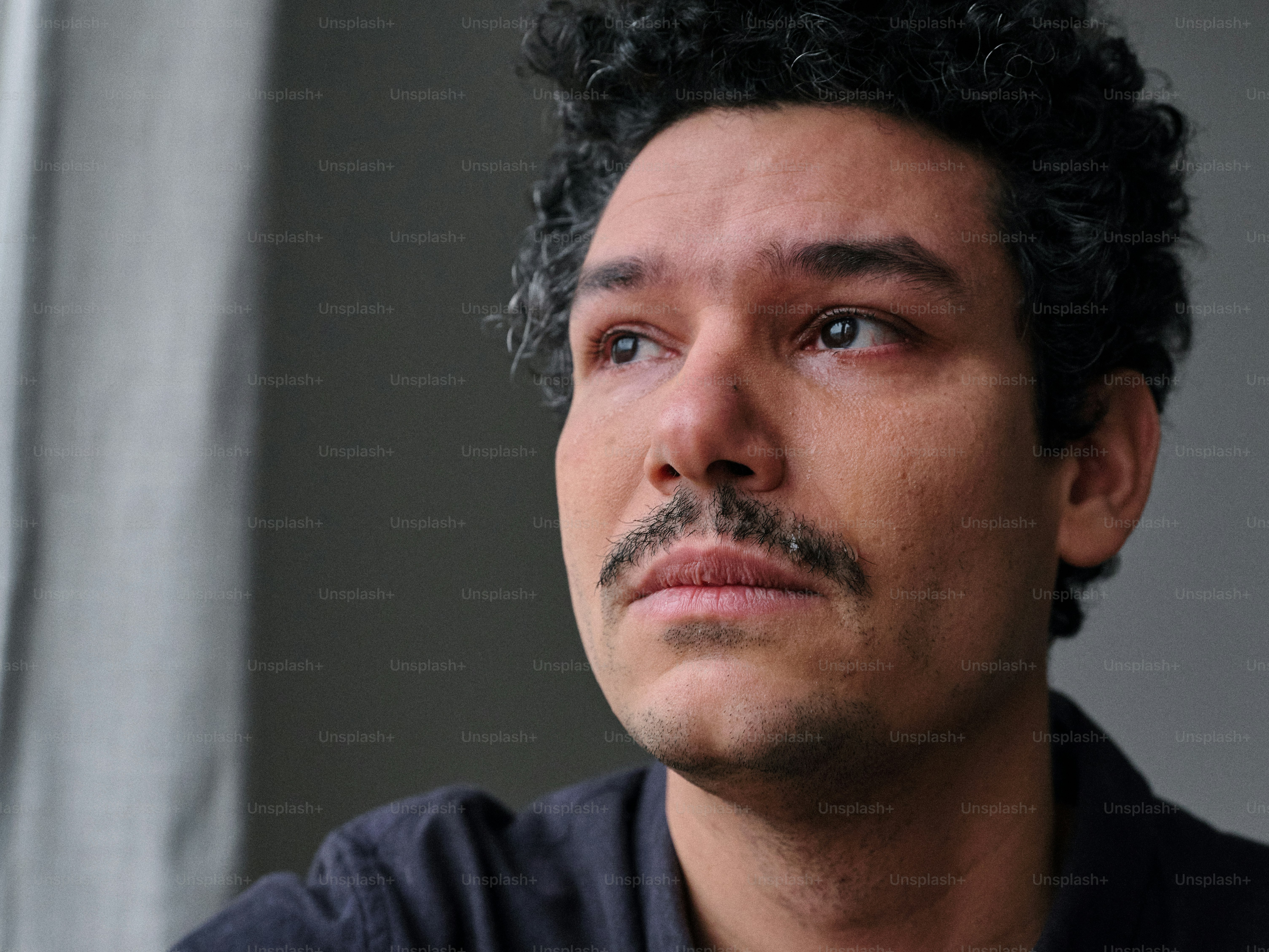 A close up of a person with a mustache photo – Portrait Image on Unsplash