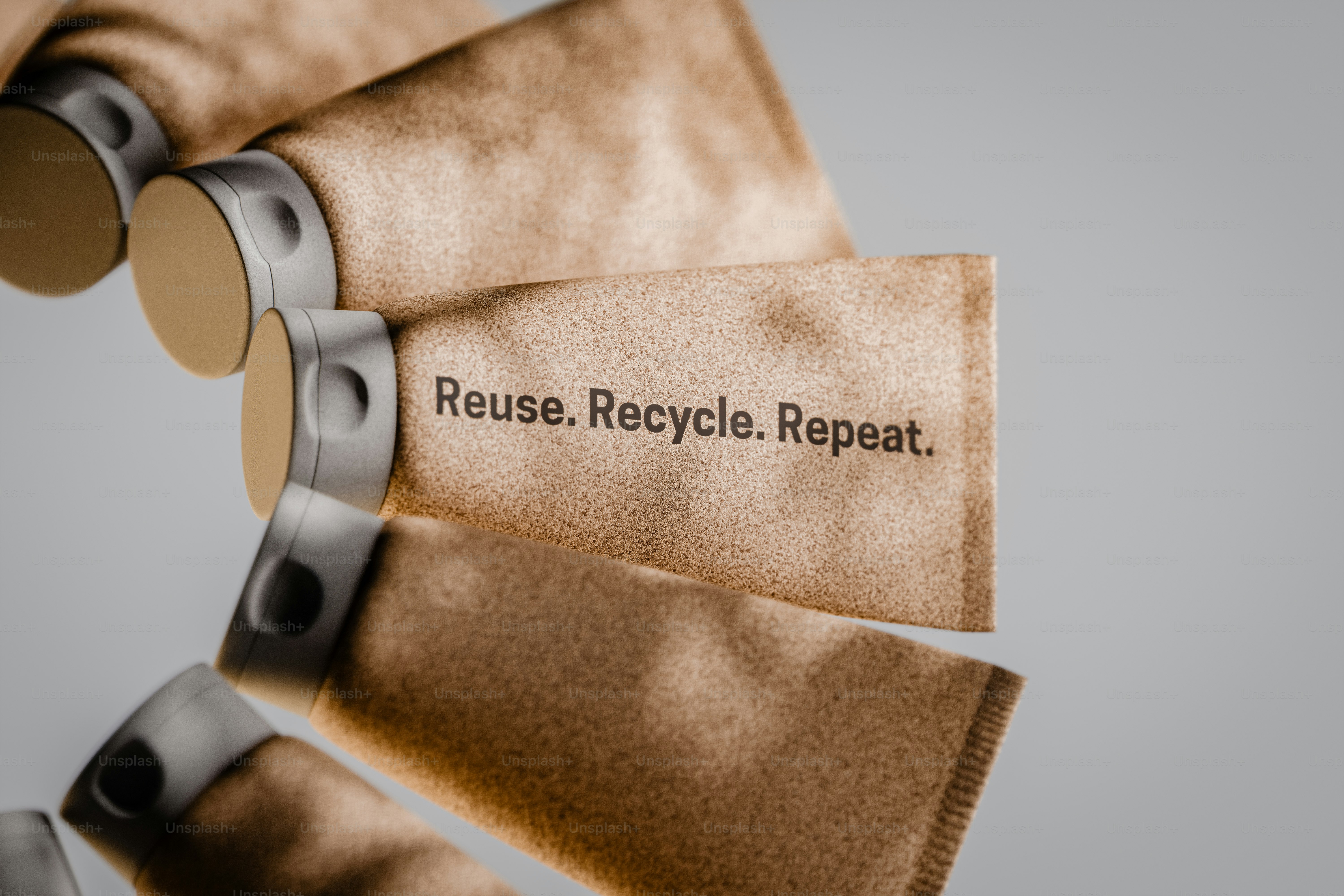 A close up of a piece of paper with the words please recycle repeat ...