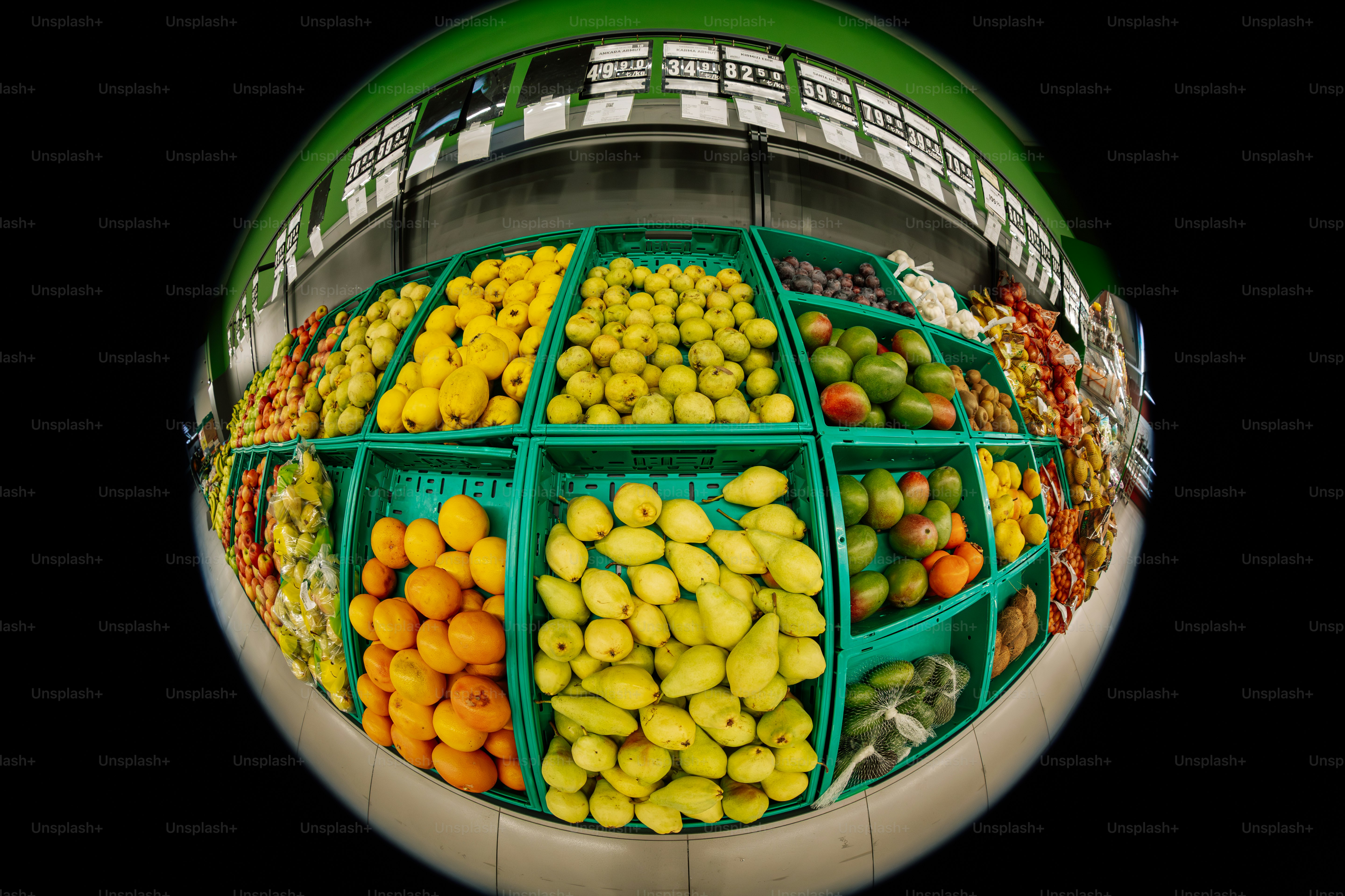 A large display of fruits and vegetables in a grocery store photo ...