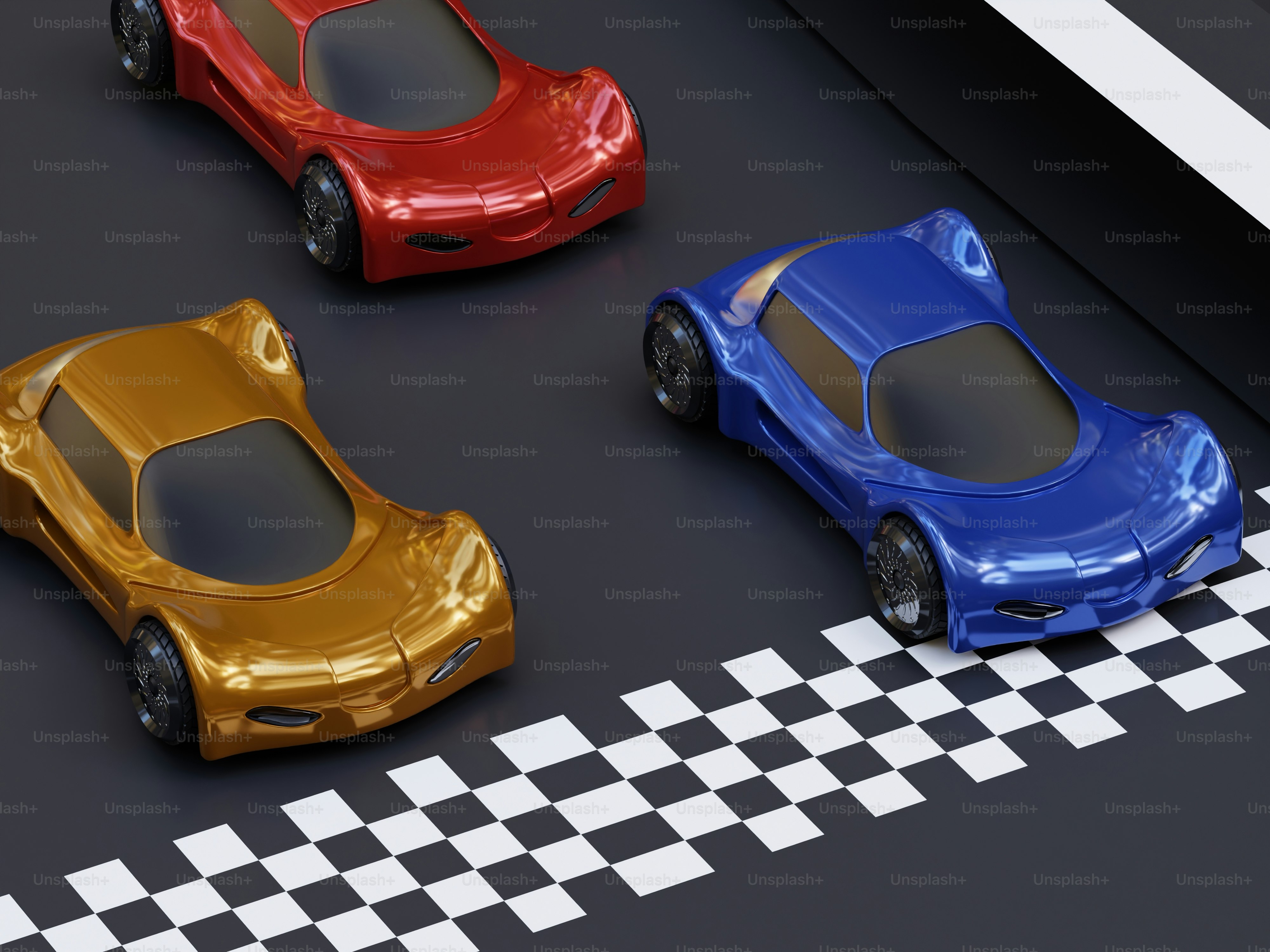 A group of four toy cars on a race track photo – Car Image on Unsplash