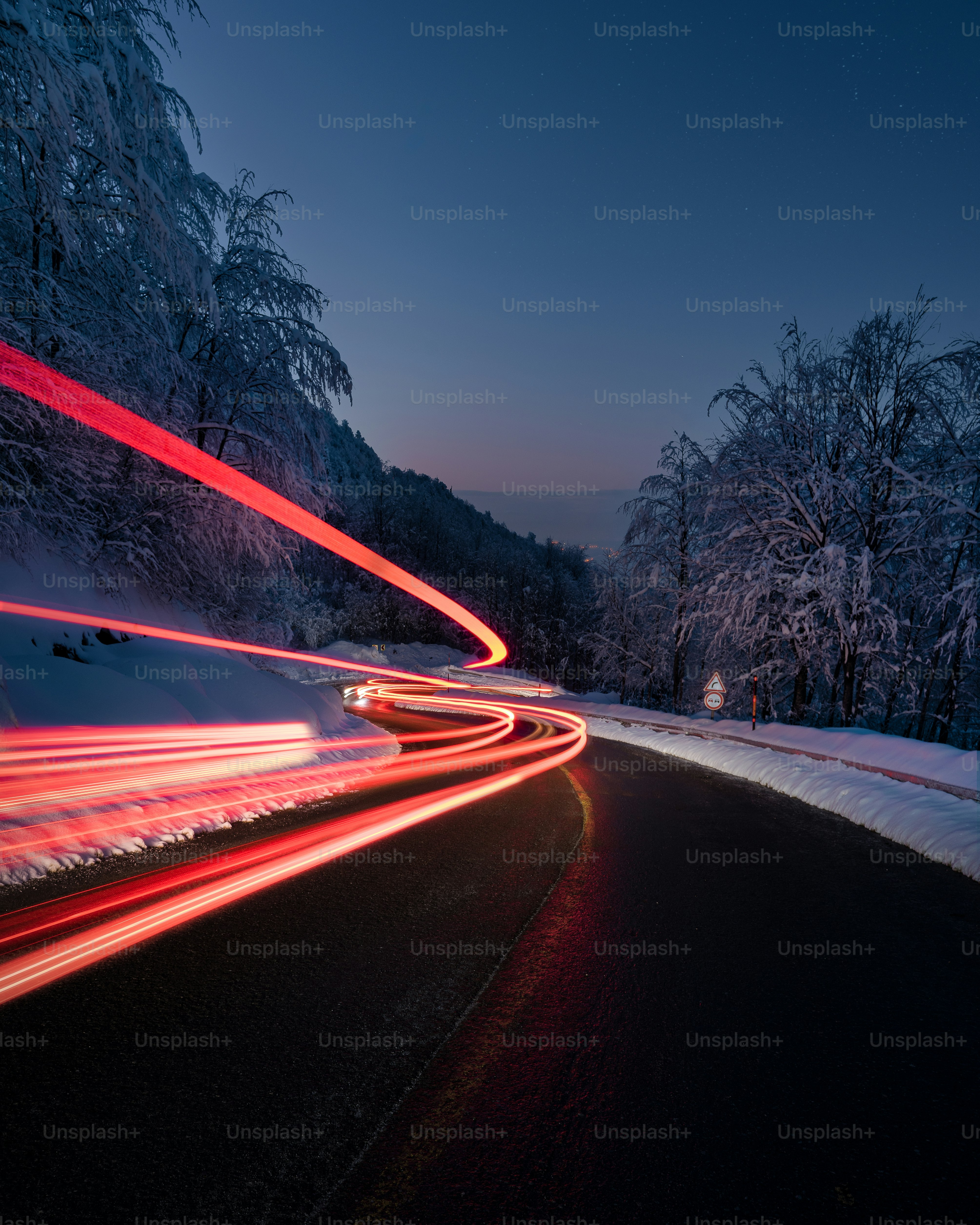 A long exposure photo of a road at night photo – Forest Image on Unsplash