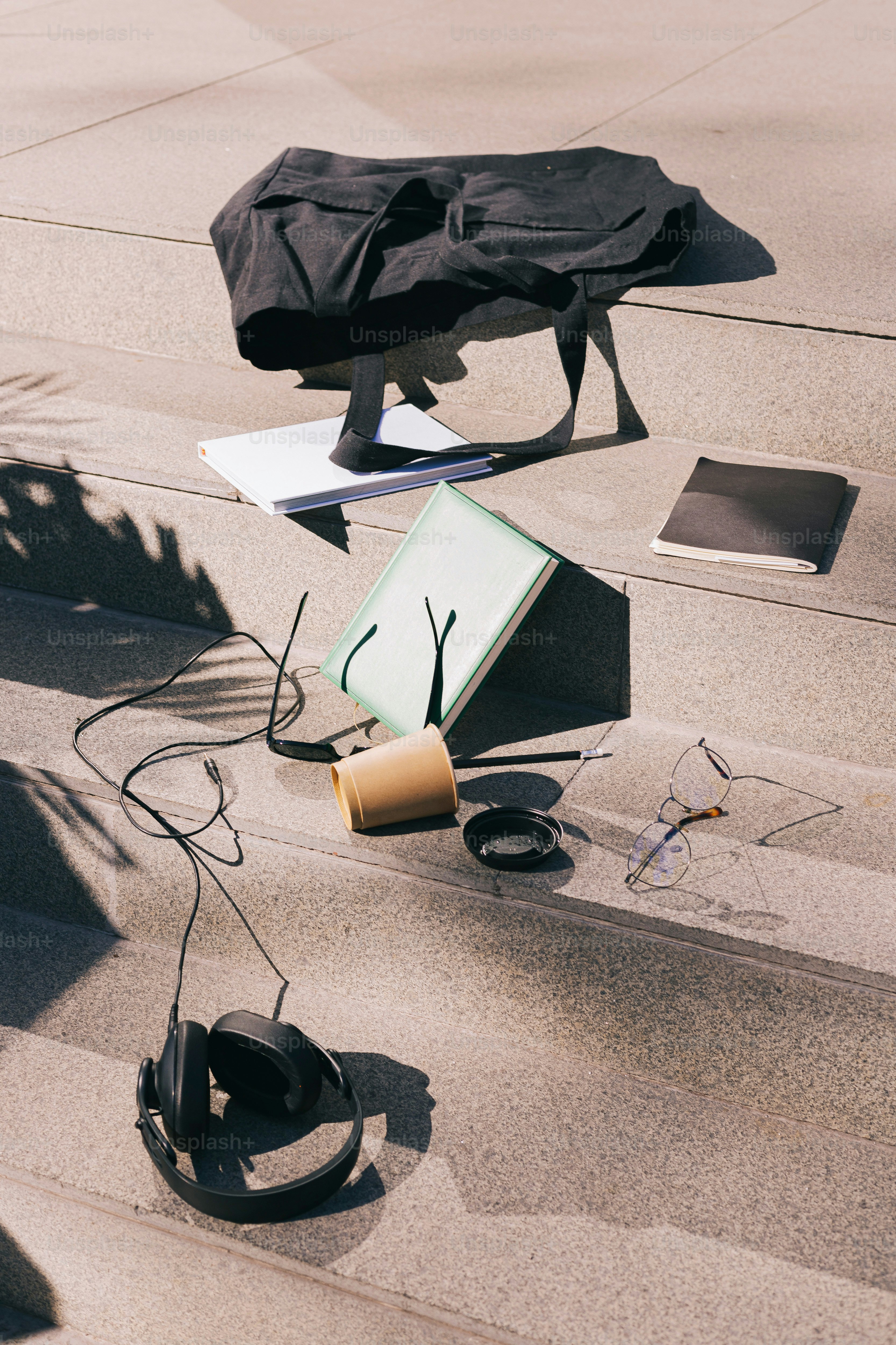 A bunch of objects that are laying on the ground photo – Playful Image ...
