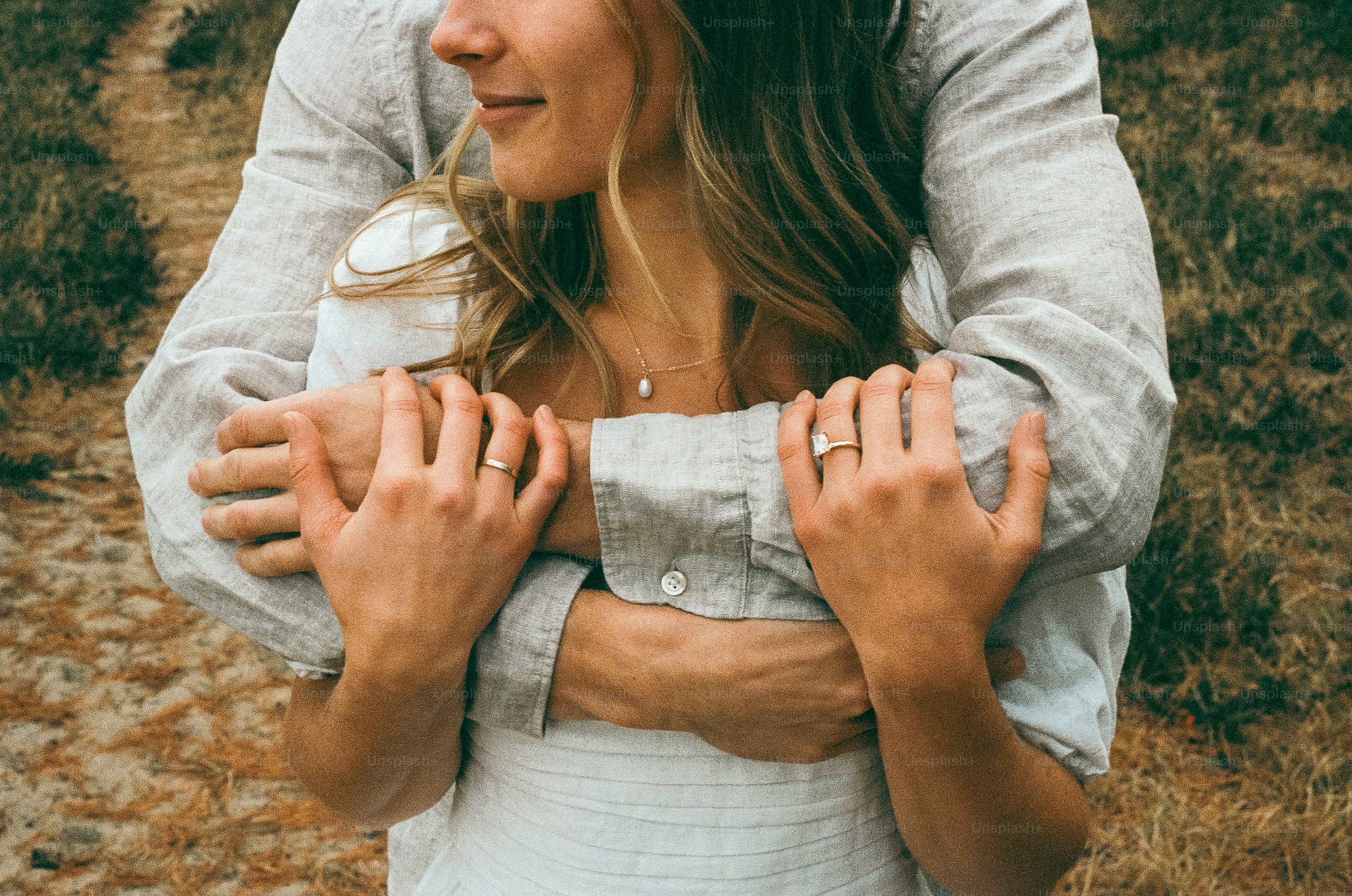 Couple embracing with arms around each other. photo – Love Image on ...