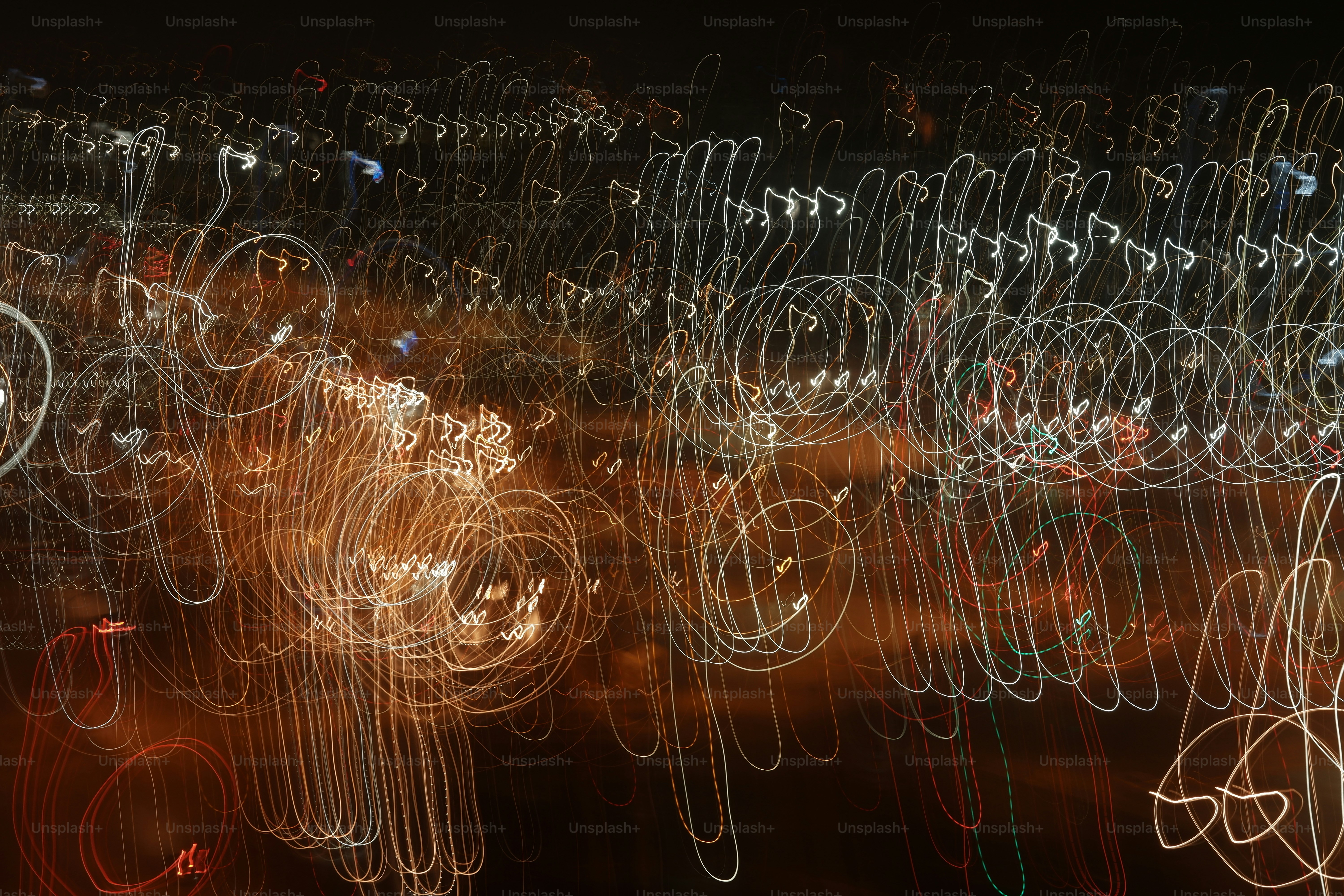 A blurry photo of a city street at night photo – In motion Image on ...