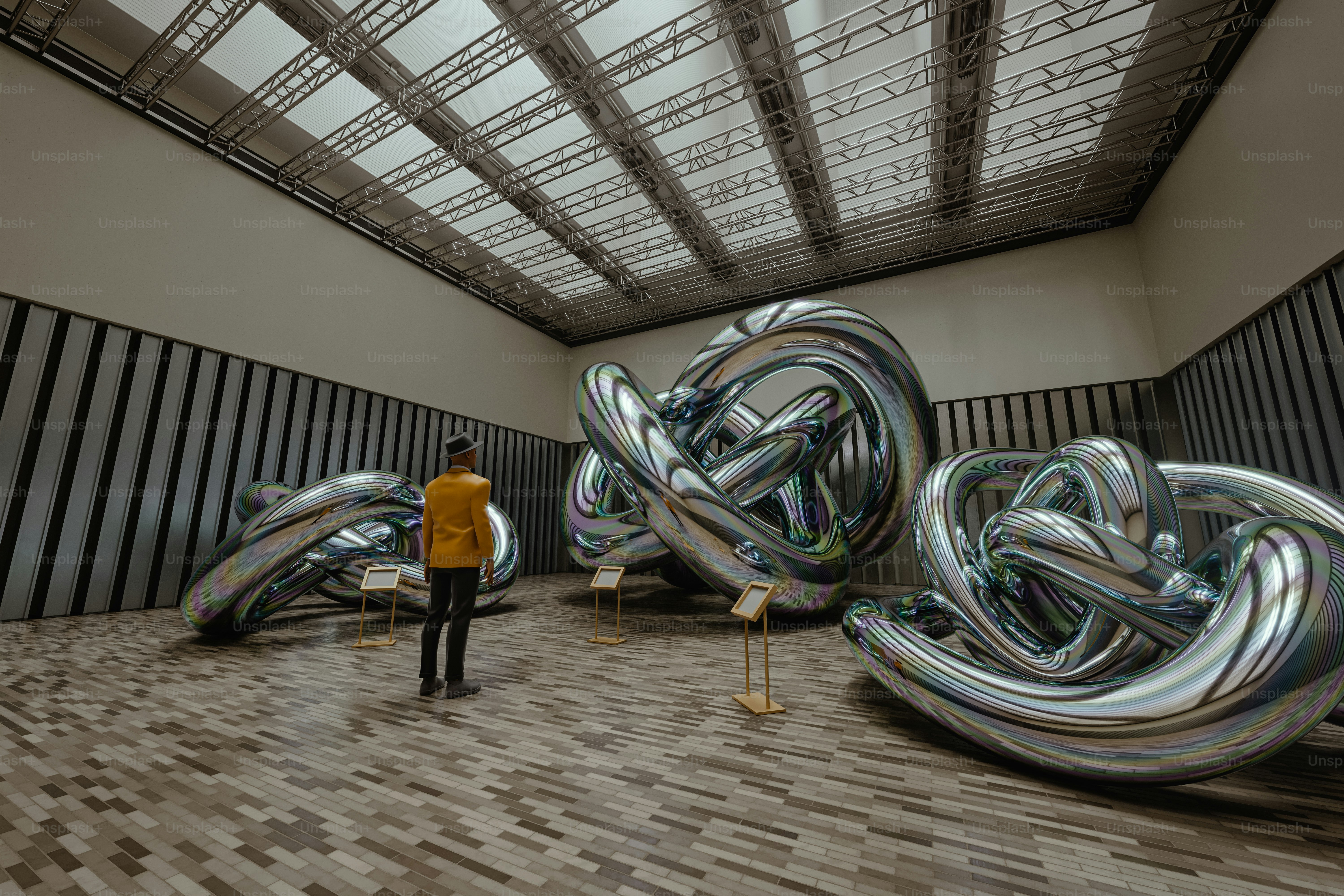 A person standing in a room with a bunch of metal objects photo ...