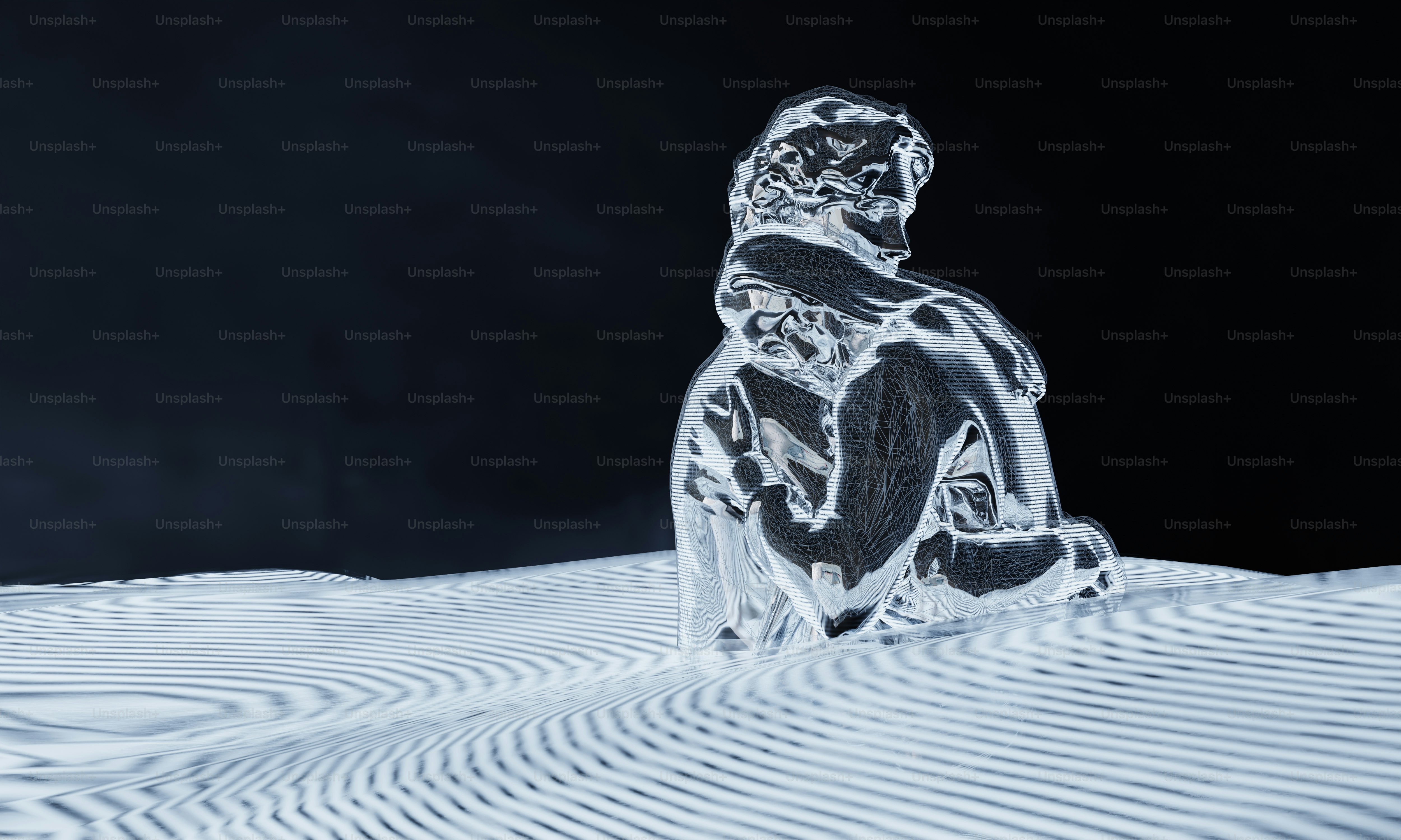 An ice sculpture of a person sitting in the snow photo – Human Image on ...
