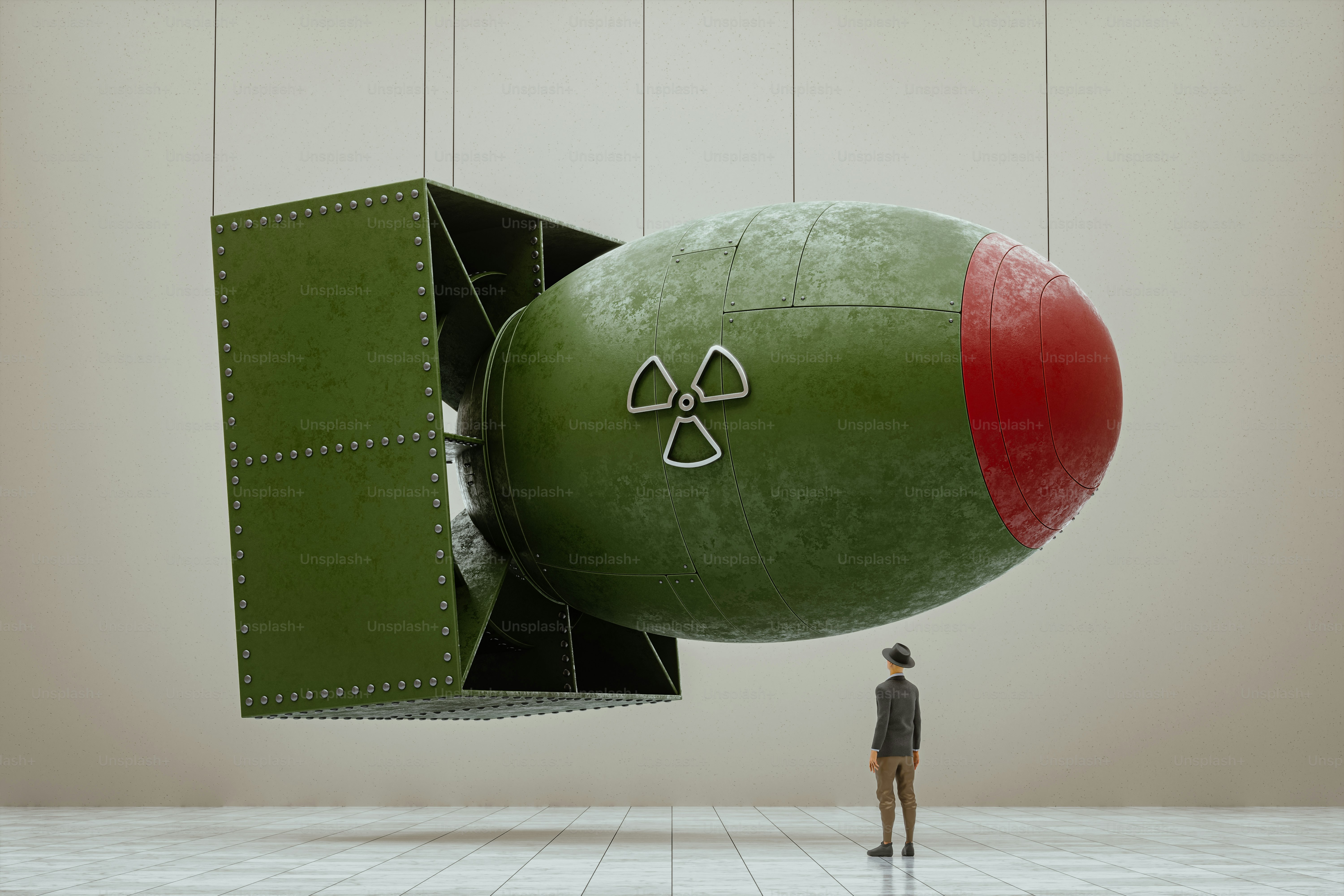 A person contemplates a giant, suspended atomic bomb. photo – Wallpaper ...