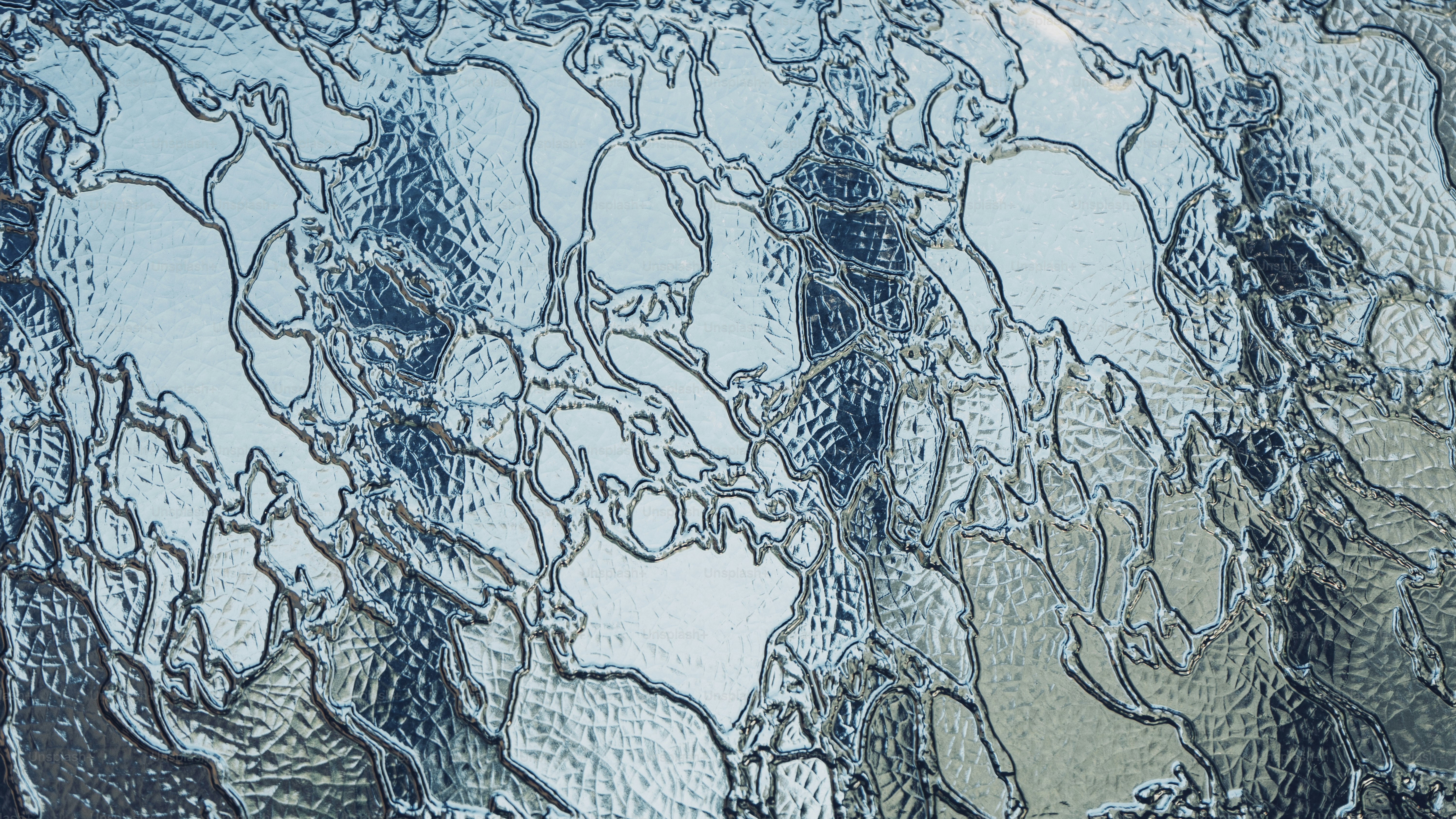 El vidrio texturizado crea un diseño interesante y abstracto. foto ...