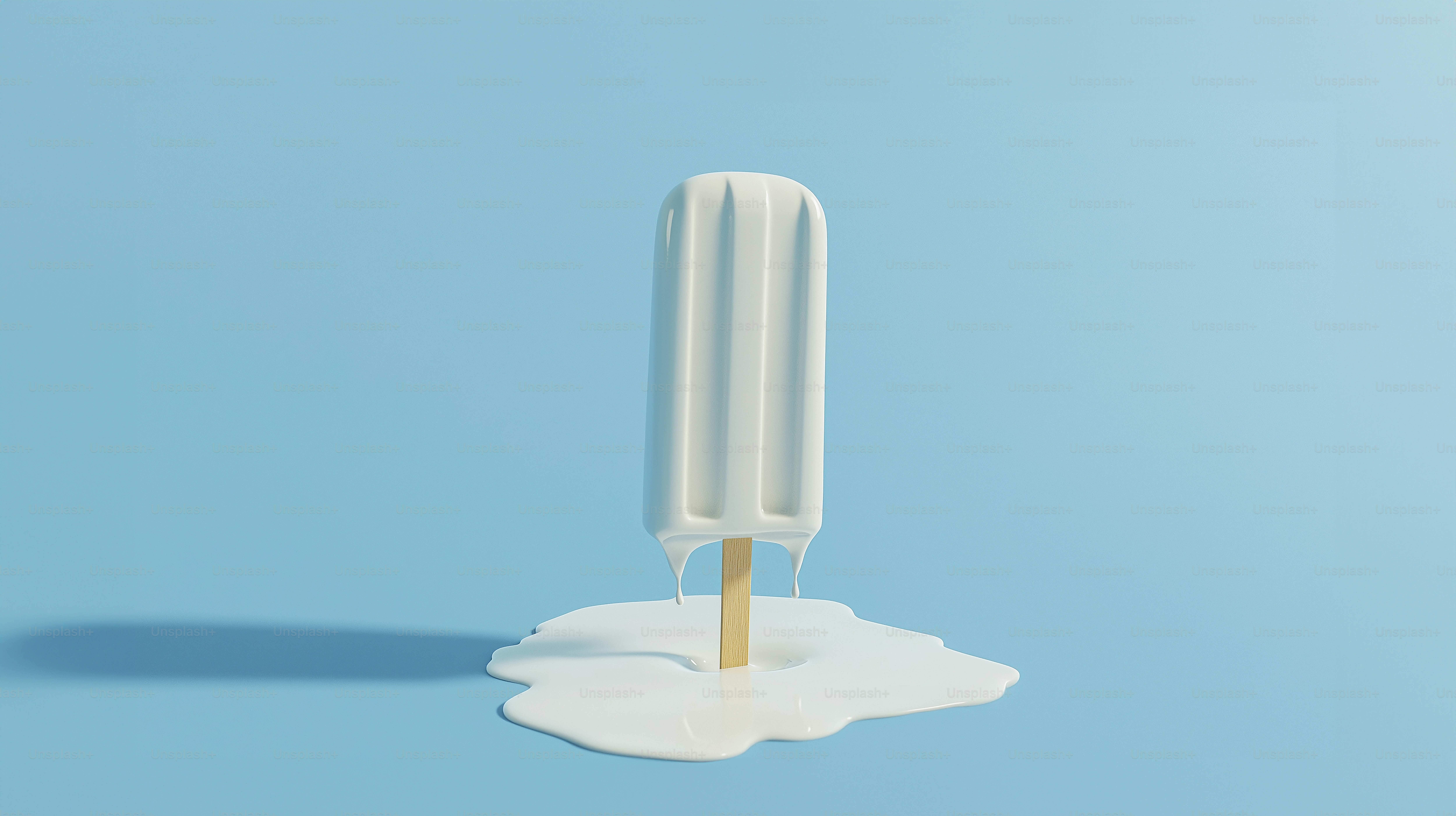 Melted popsicle on a cool, blue background. photo – Art Image on Unsplash