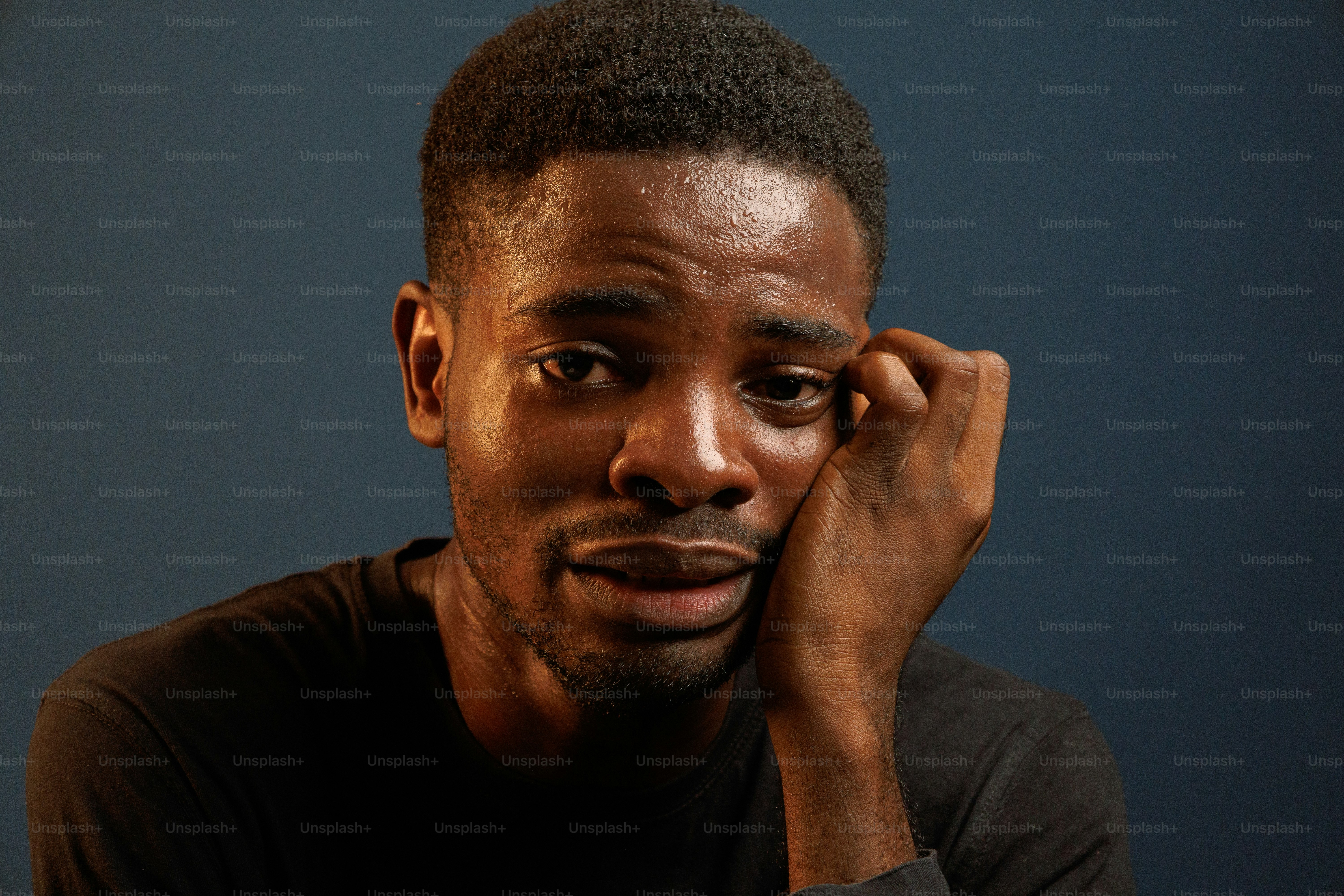 A man looks sad and tearful. photo – Sad Image on Unsplash