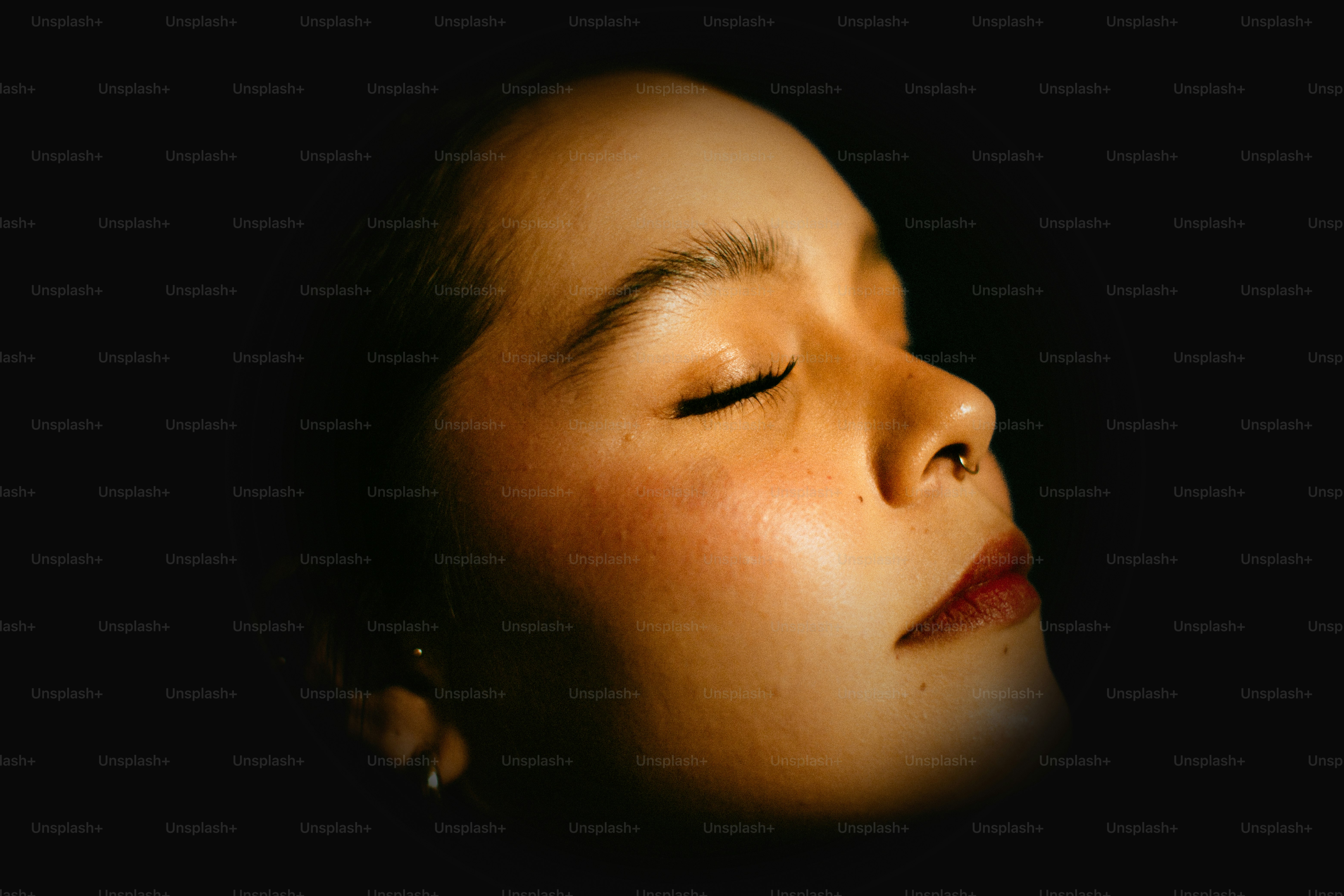 Woman has her eyes closed in a dramatic light. photo – Portrait Image ...
