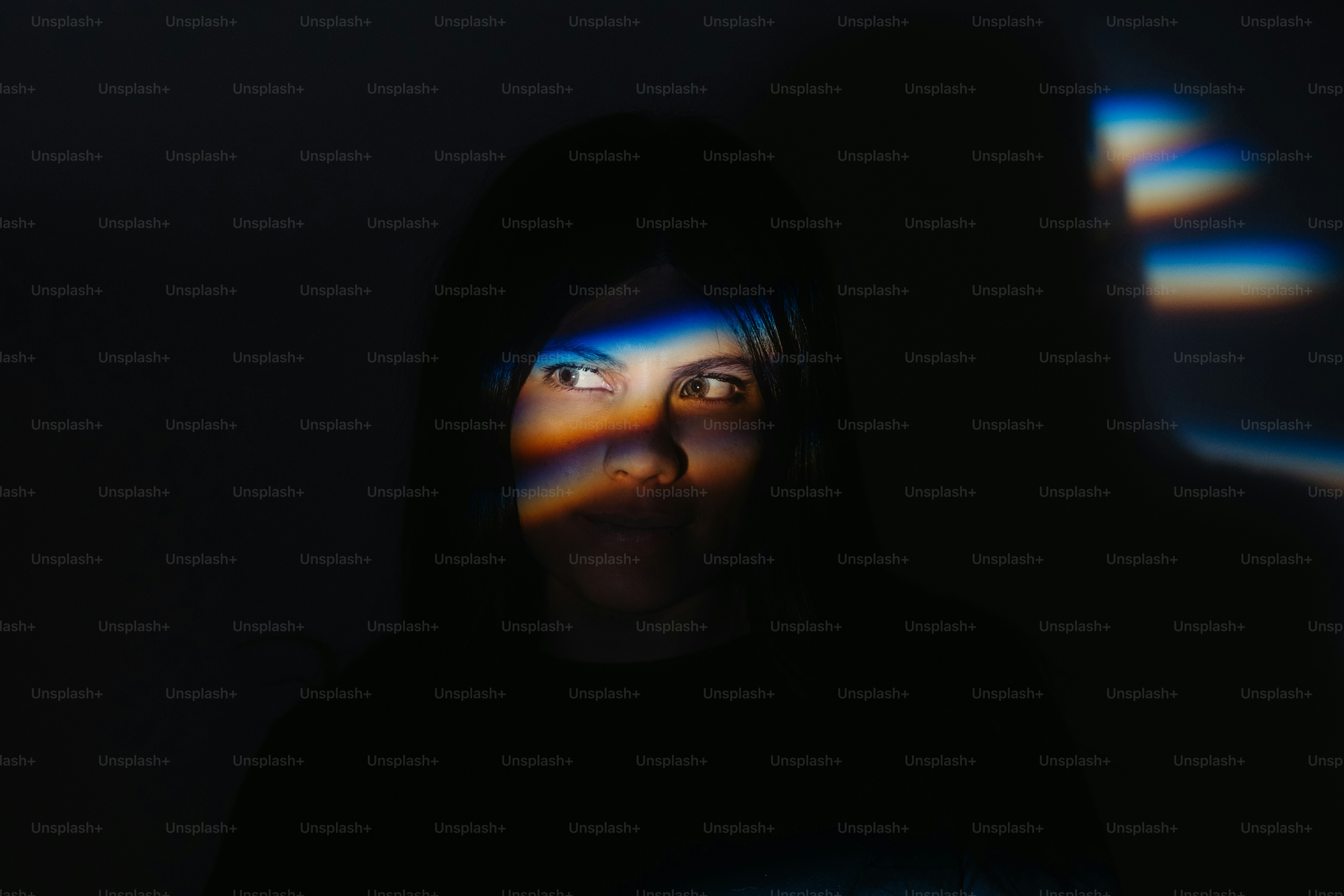 A person's face is illuminated by rainbow light. photo – Portrait Image ...