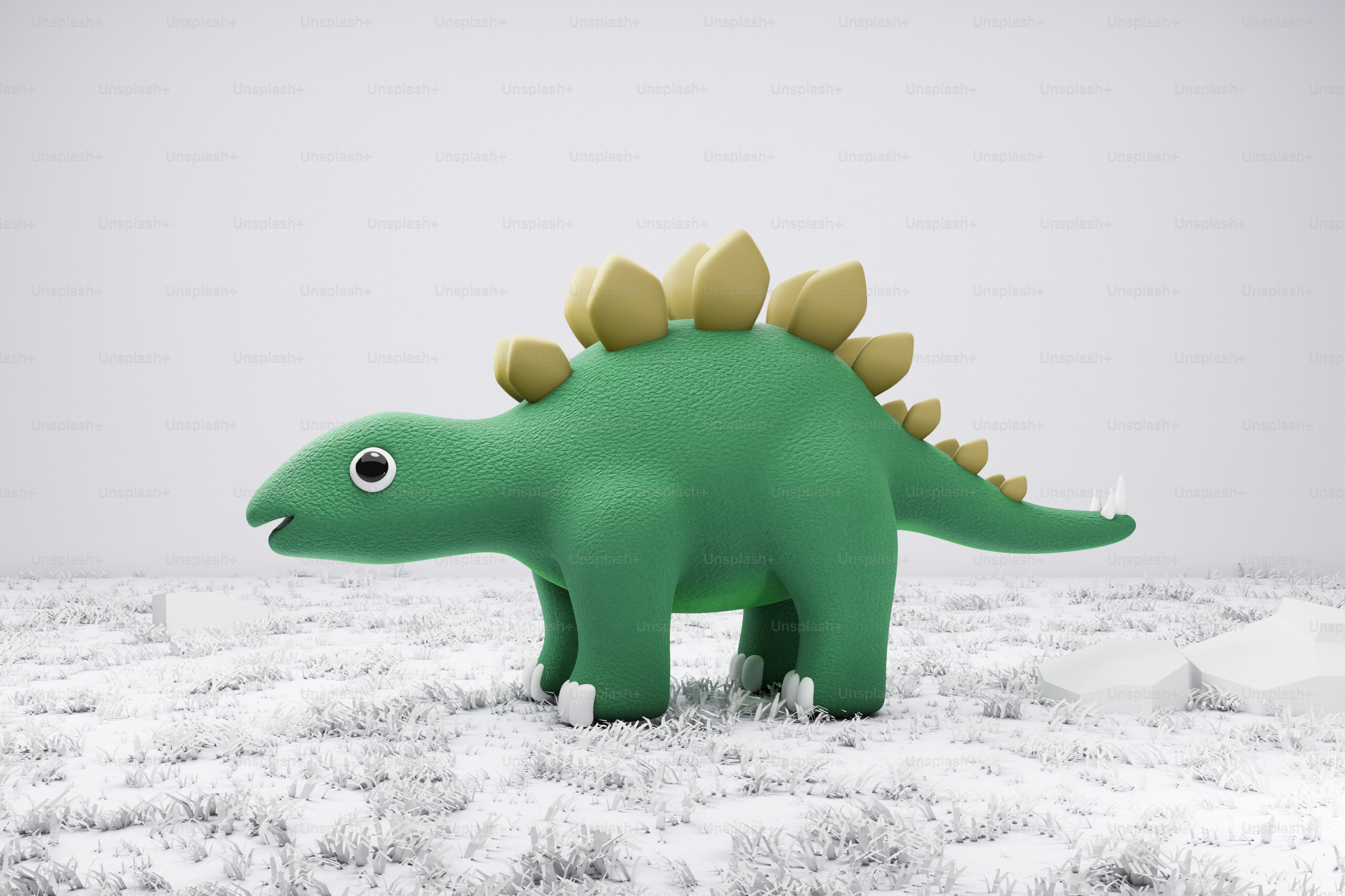 A cute green dinosaur stands in the snow. photo – Animal Image on Unsplash