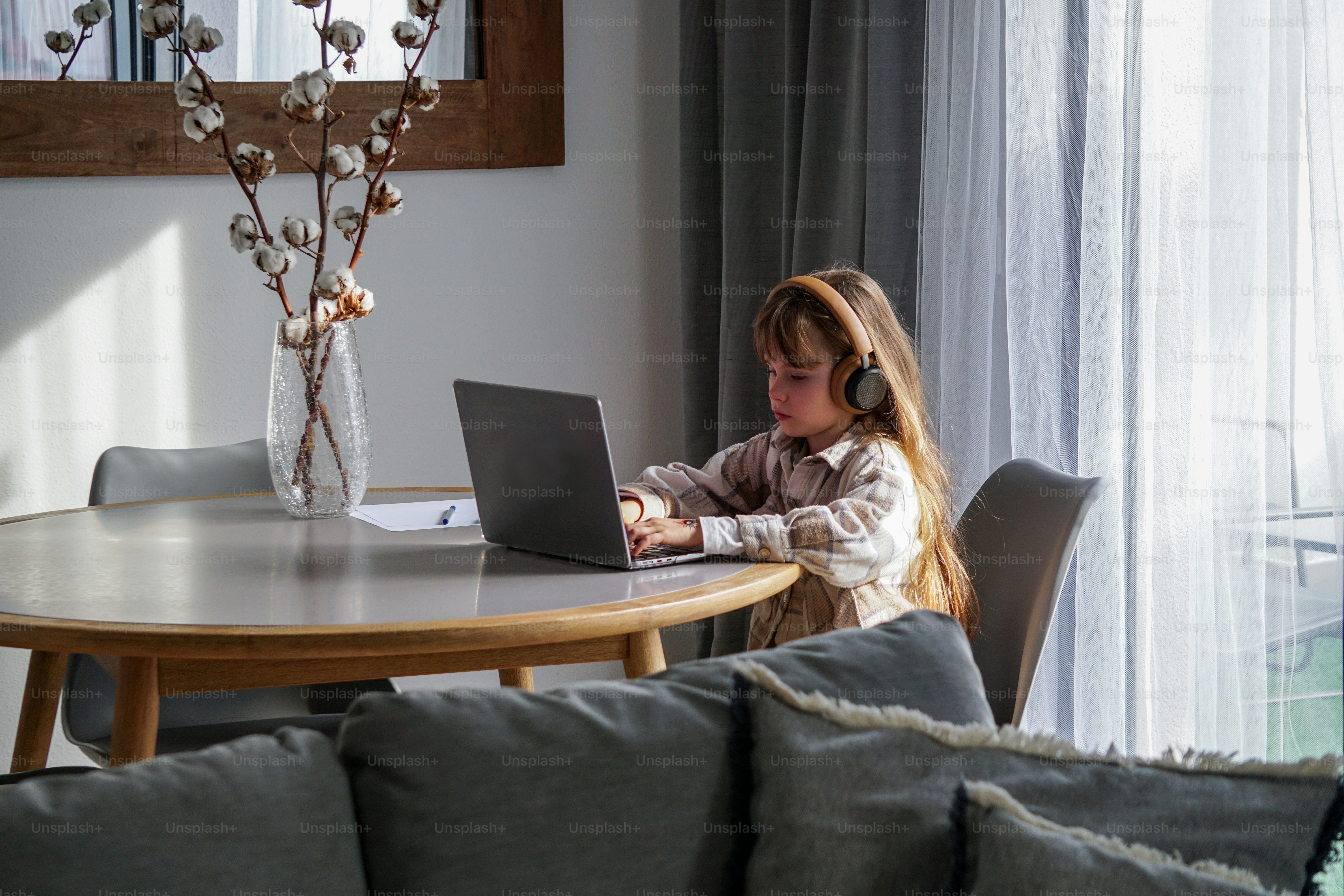 Girl using laptop at home, learning online. photo – Technology Image on ...