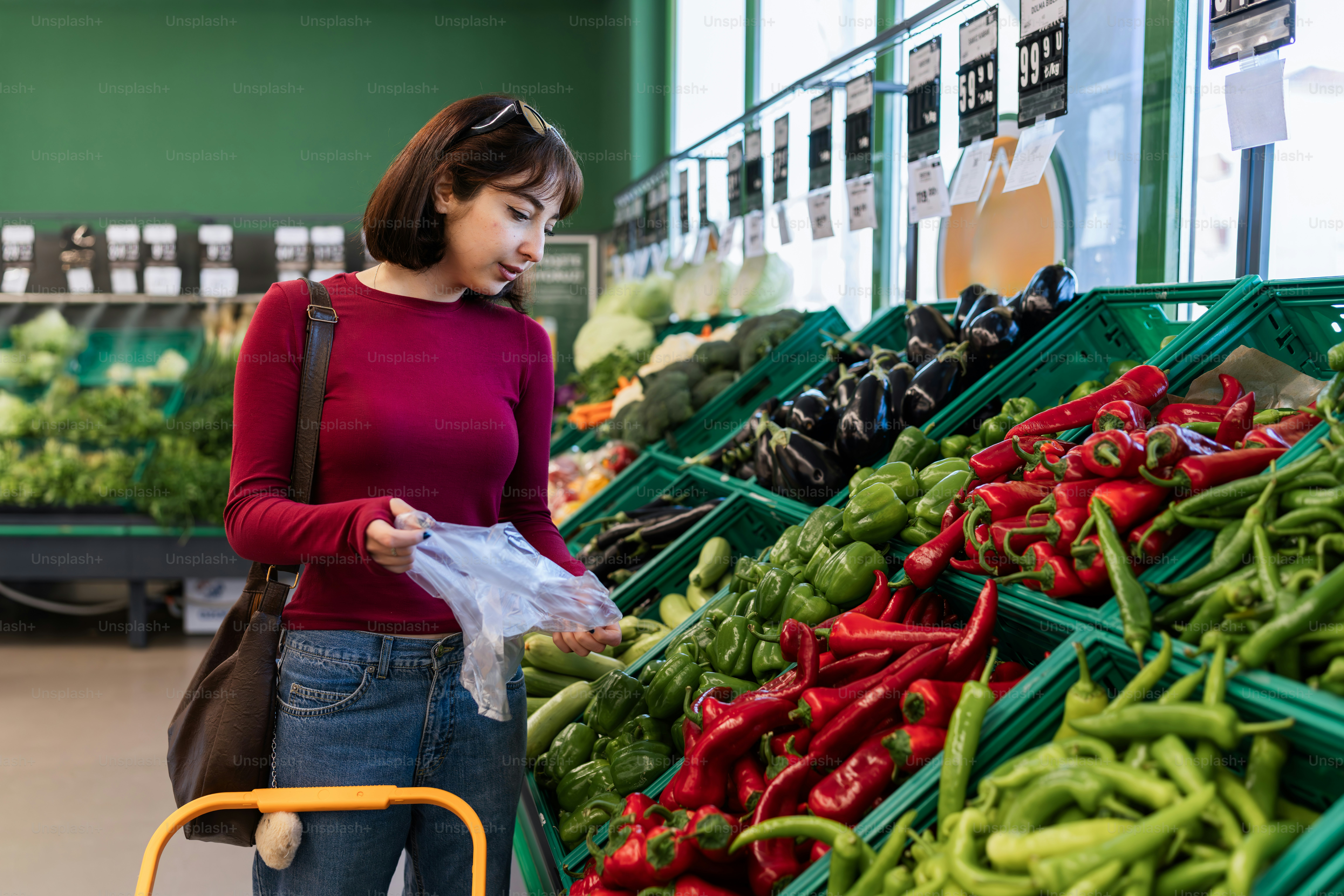Woman shopping for fruits at the grocery store. photo – Shopping Image ...