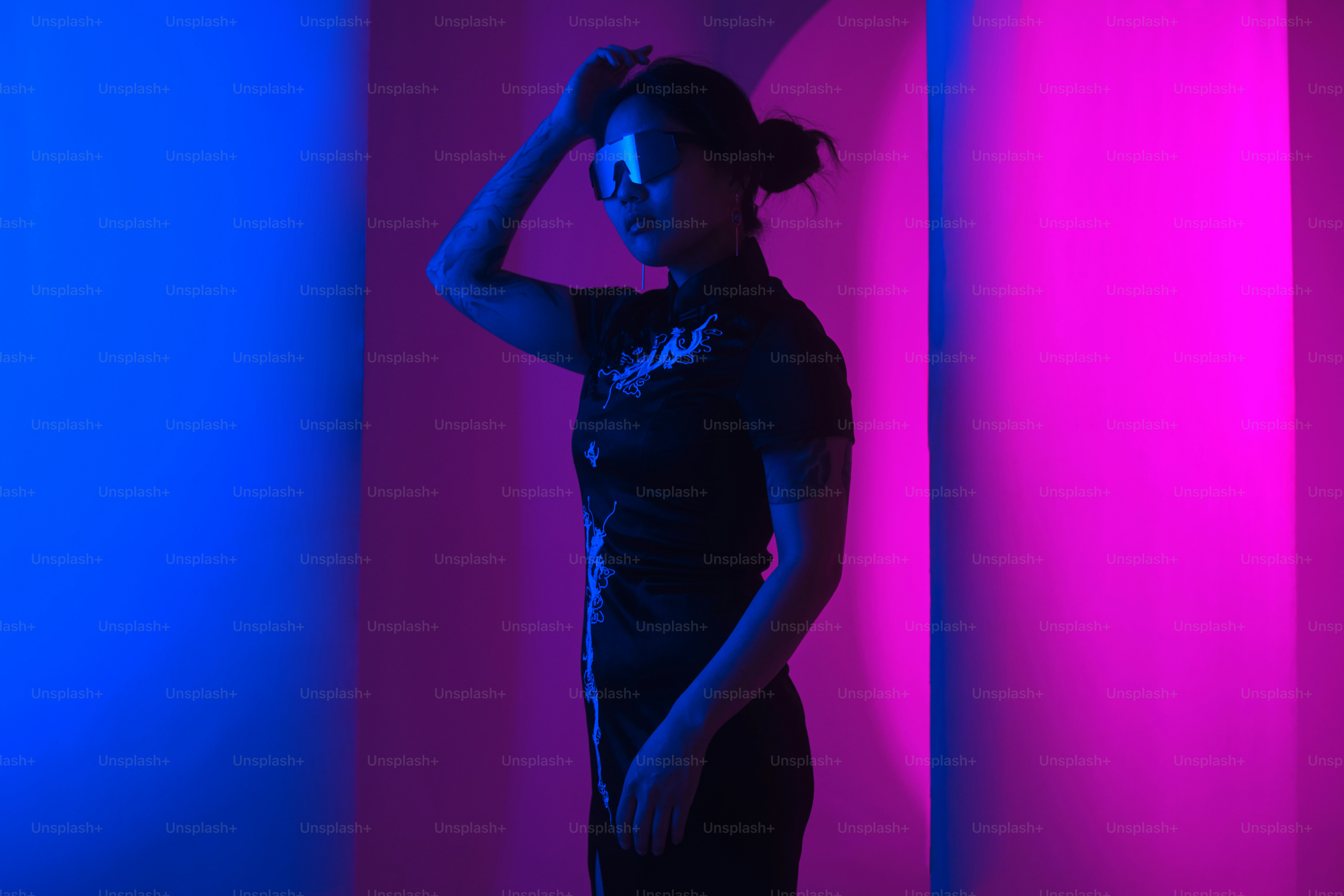 Woman poses in a neon-lit, colorful hallway. photo – Portrait Image on ...