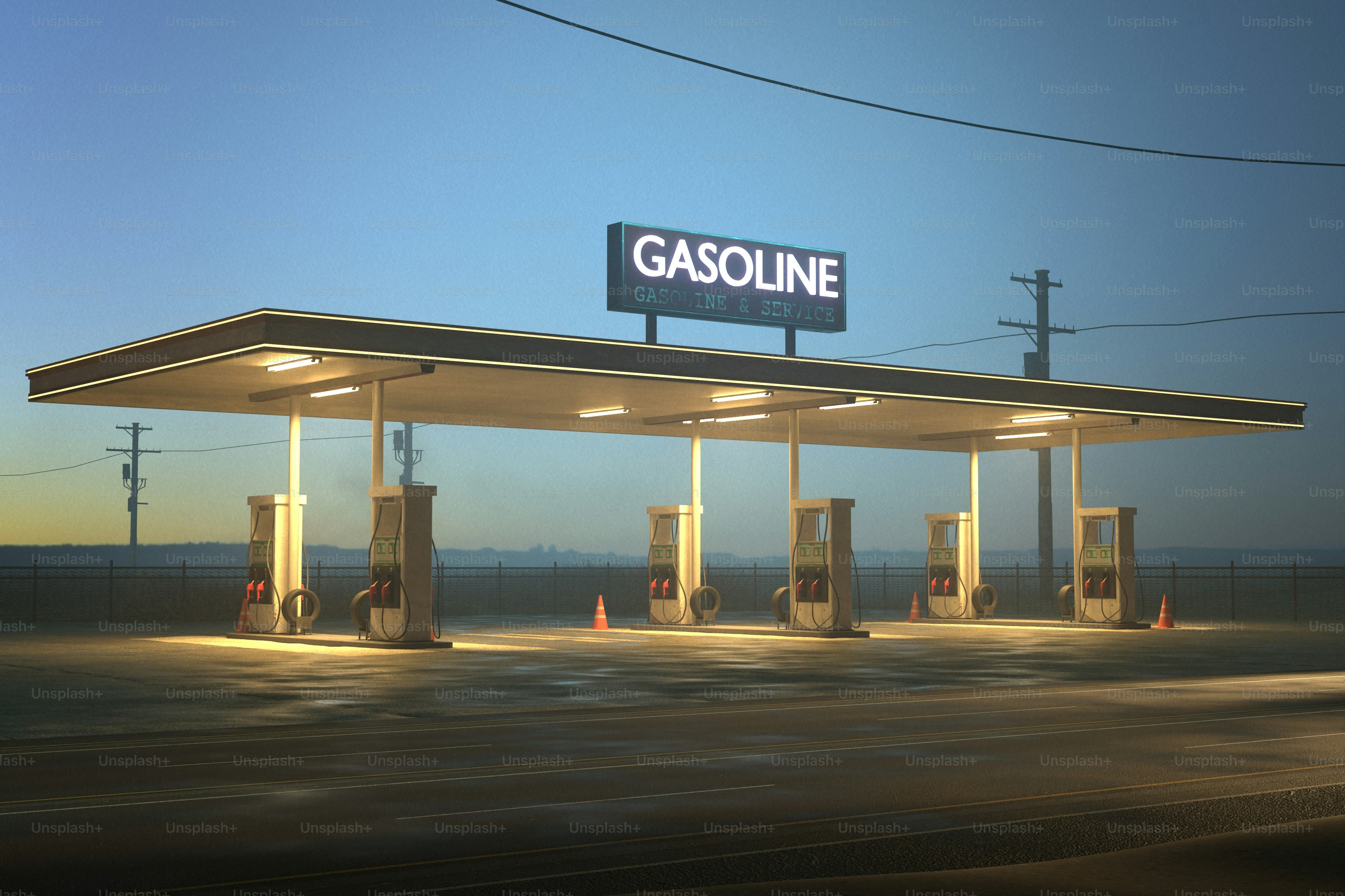 A gas station stands lit at dusk. photo – Design Image on Unsplash