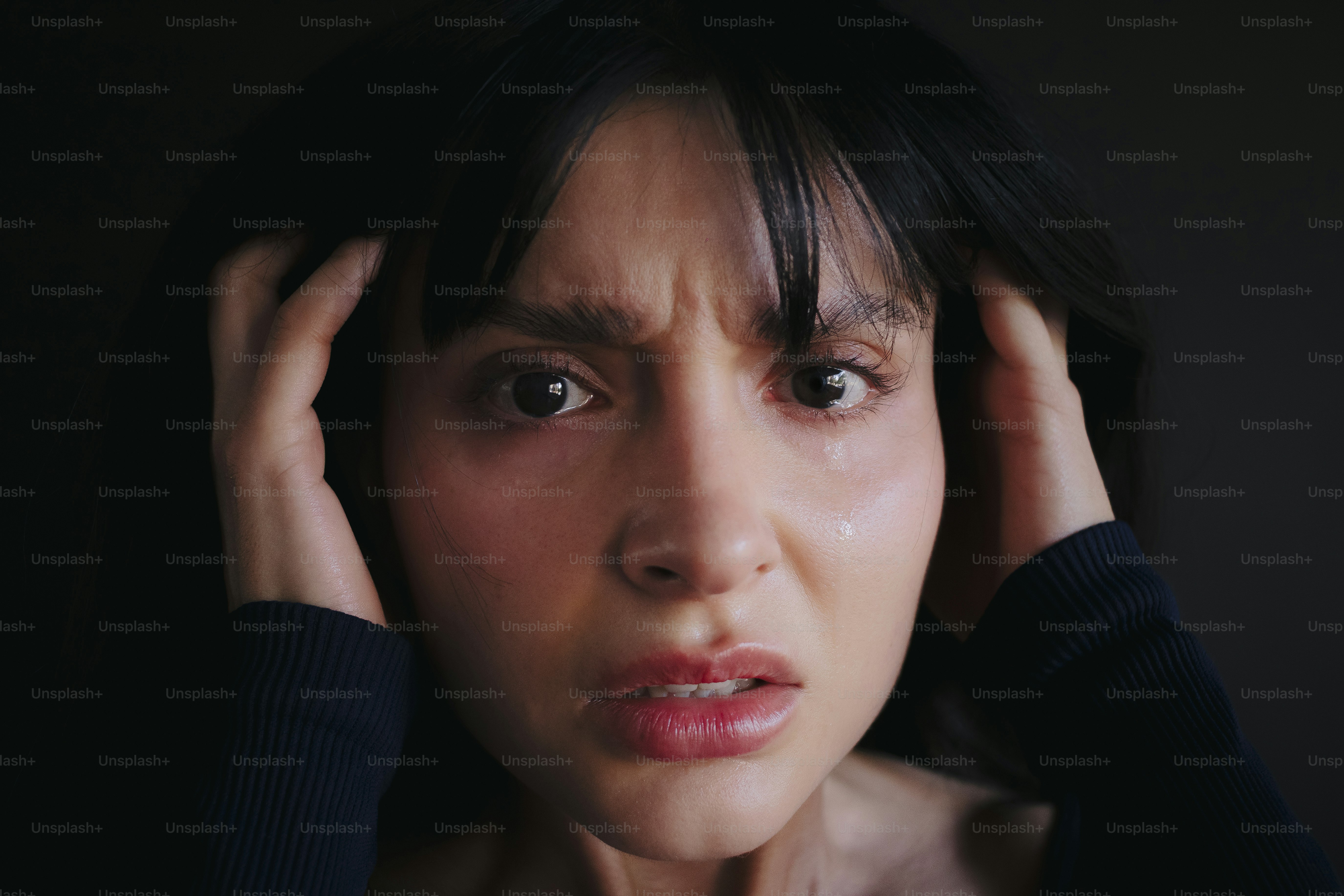 A woman appears distressed, under extreme pressure. photo – Depression ...